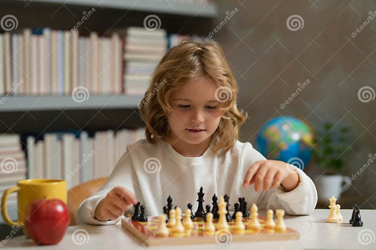 Concentrated Child Boy Developing Chess Strategy, Playing Board Game ...
