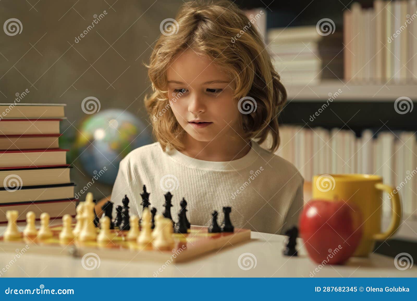 Concentrated Child Boy Developing Chess Strategy, Playing Board Game ...