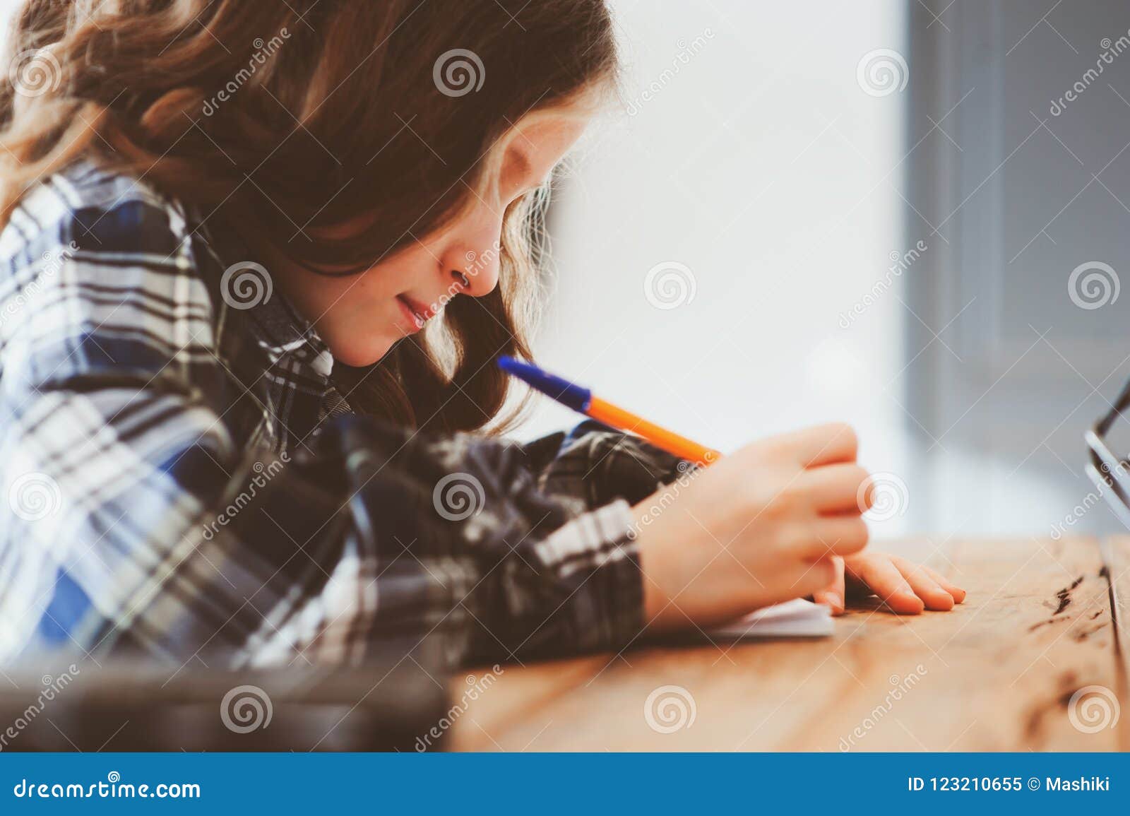 Concentrated Child Girl Doing Homework. Thoughtful School Kid Thinking ...