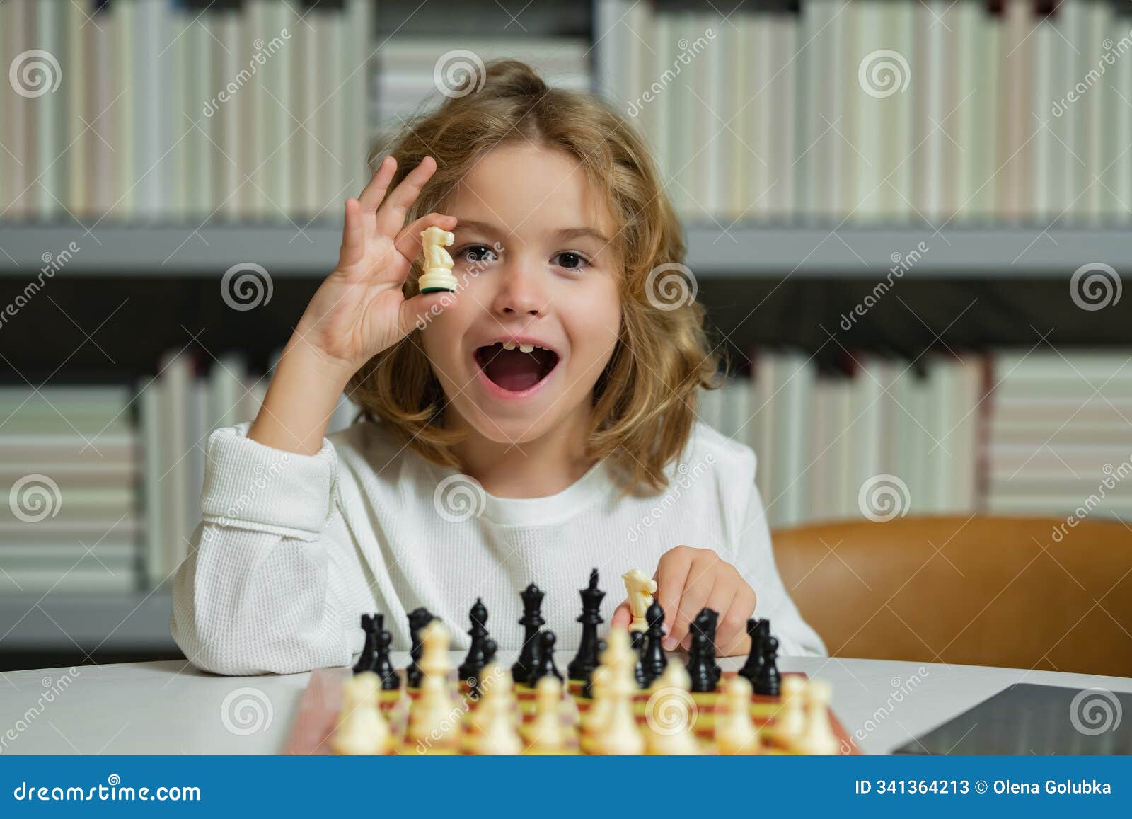 Concentrated Child Play Chess. Kid Playing Board Game. Stock Image ...