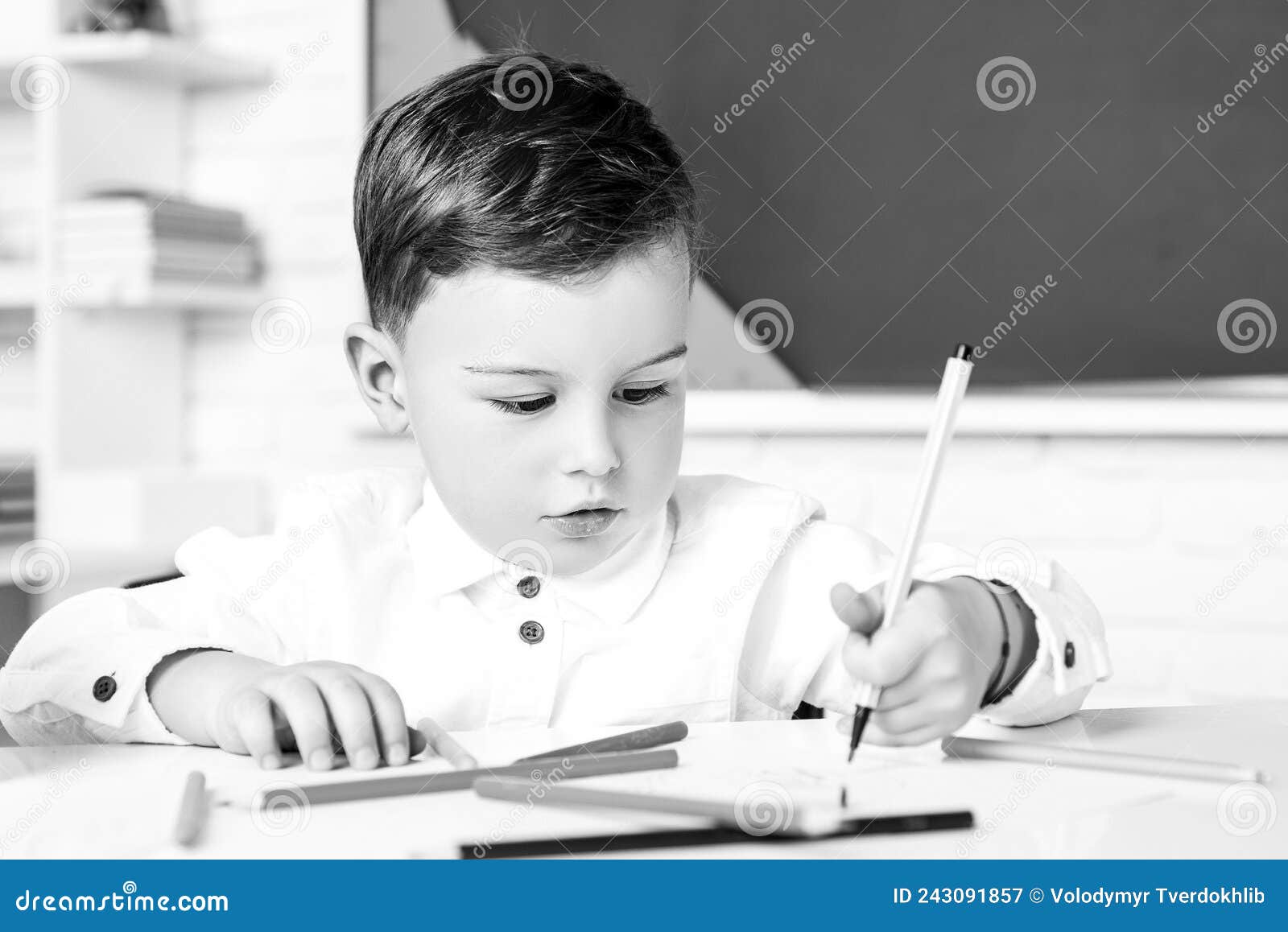 Concentrated Cute Child, Writing in Notebook Using Pencil. Cute Child ...