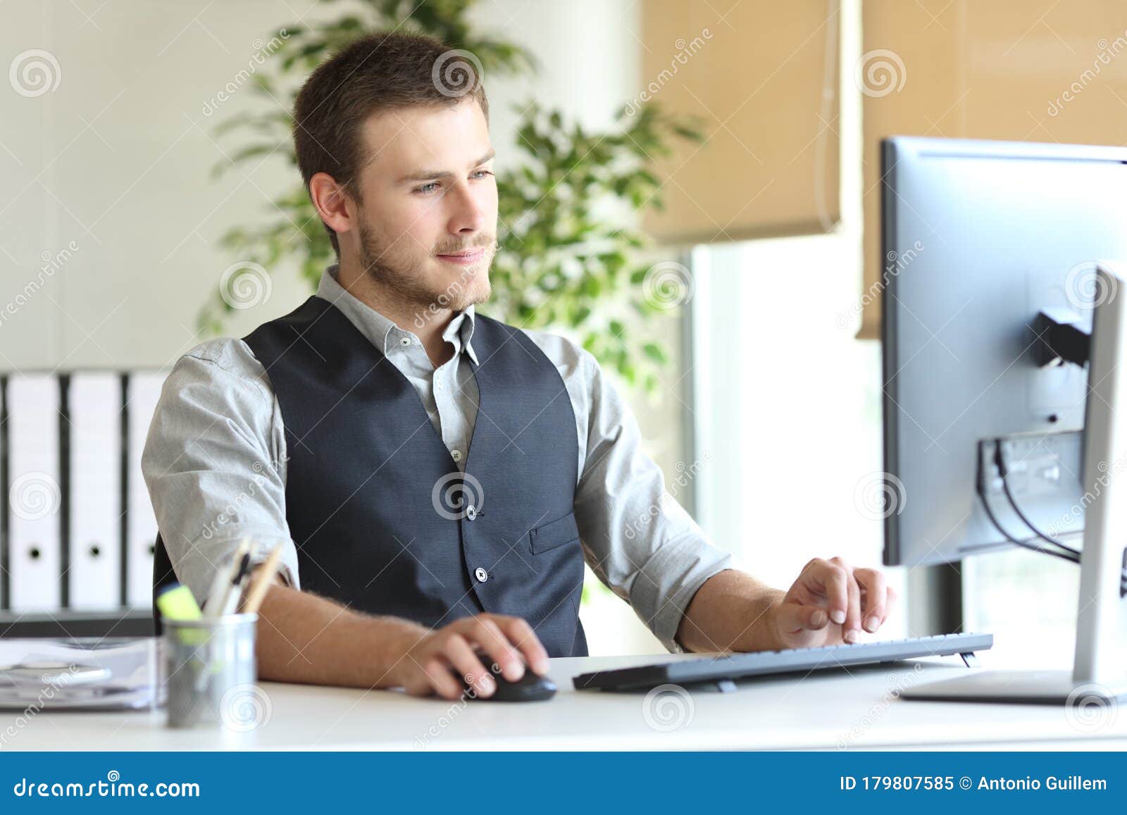 Concentrated Executive Using Computer at the Office Stock Image - Image ...