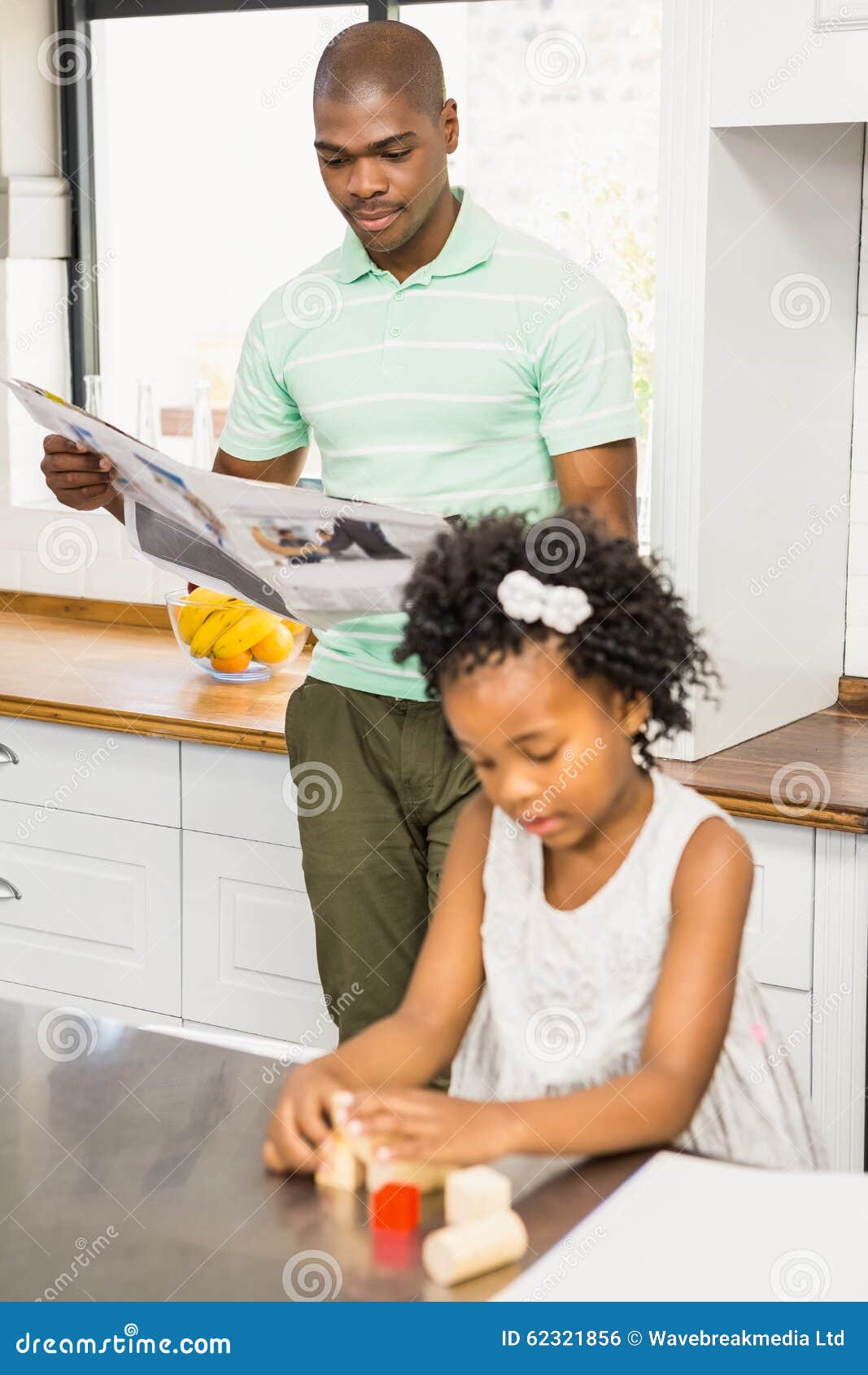 Concentrated Father Reading Newspaper Stock Photo - Image of lifestyle ...