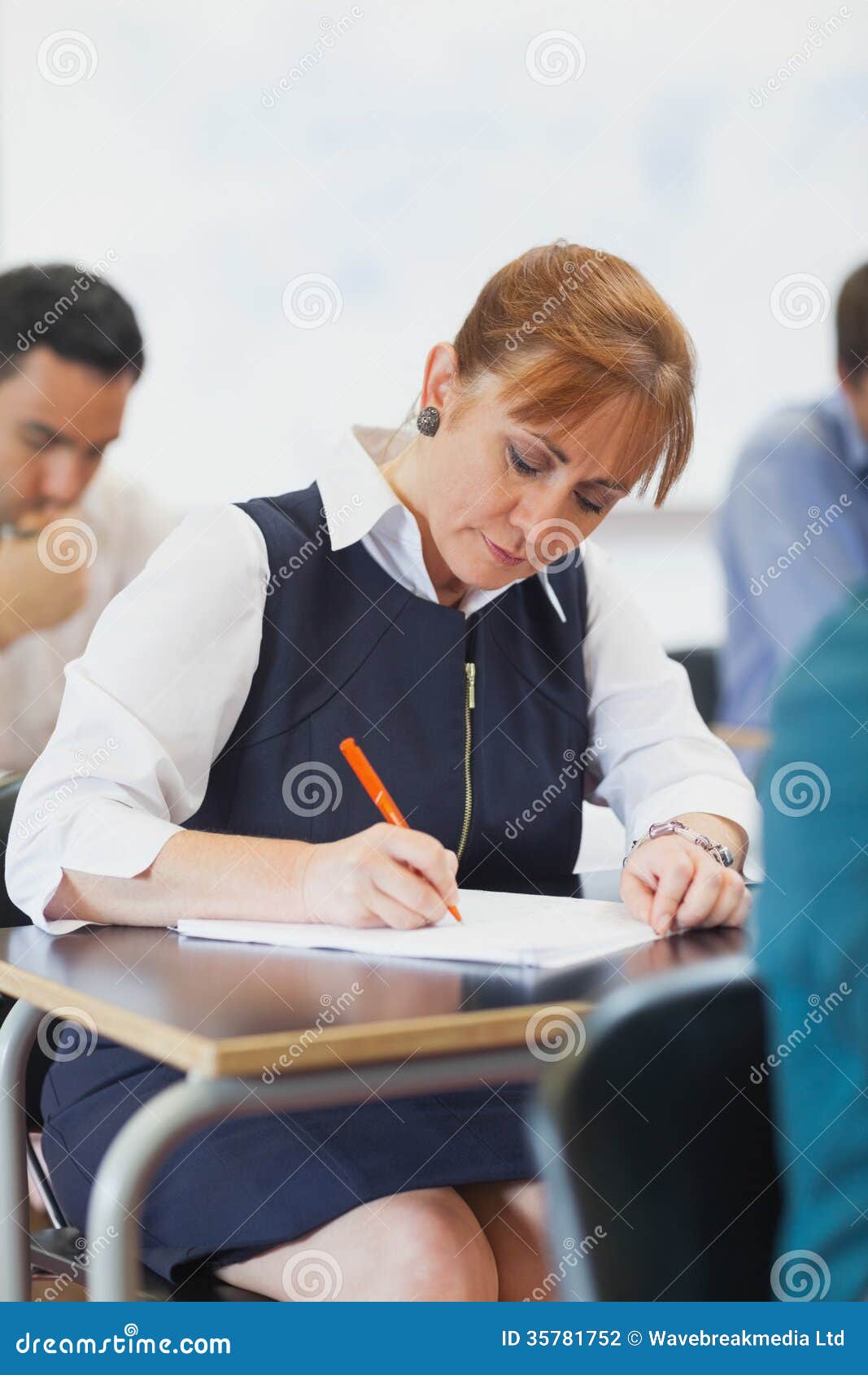 Concentrated Female Mature Student Sitting in Classroom Stock Photo ...