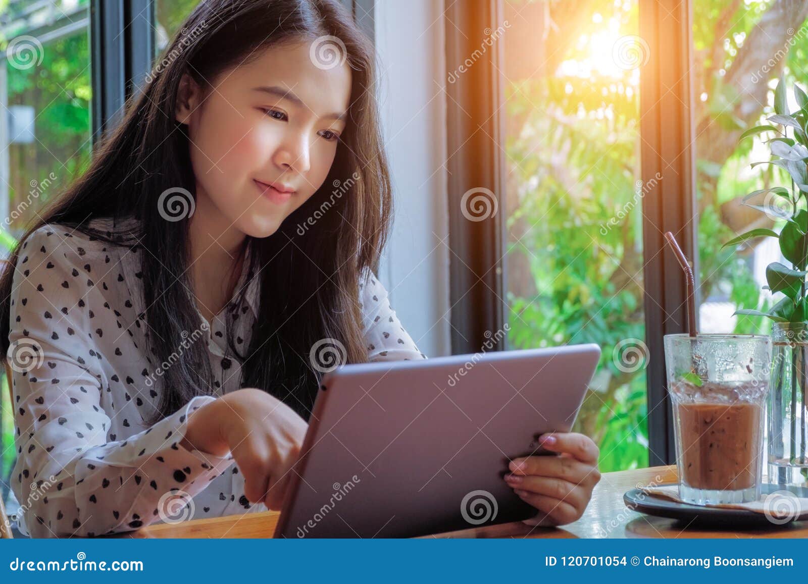 Girl Smiling while Typing on Computer. Stock Photo - Image of asian ...