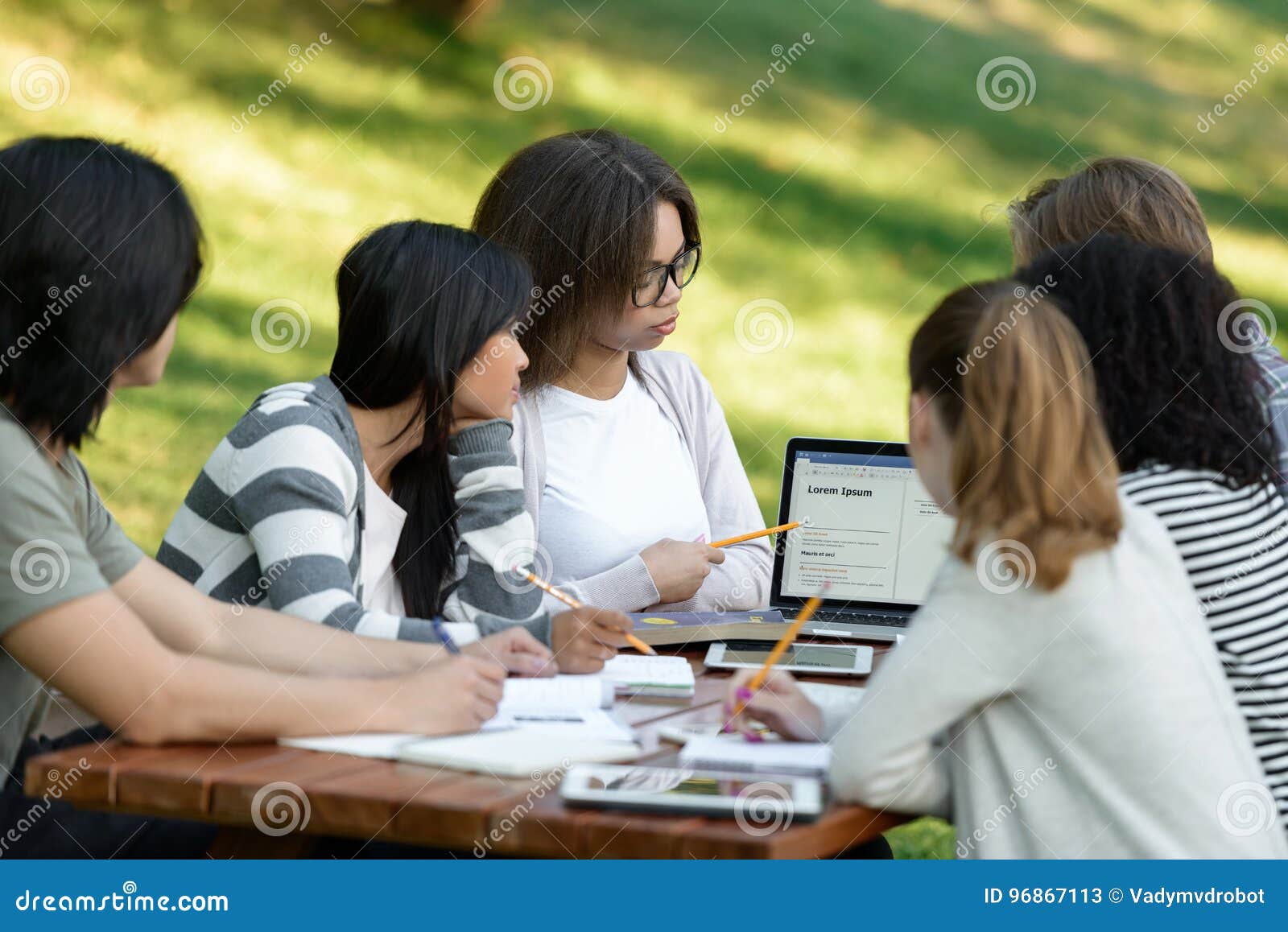 Concentrated Group of Young Students Stock Image - Image of outside ...