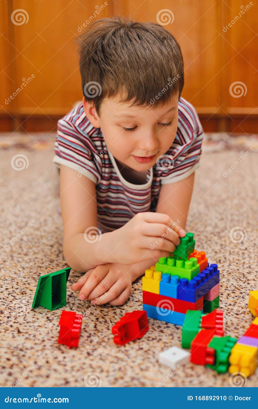 Concentrated Kid Builds a Tower from the Constructor Stock Photo ...
