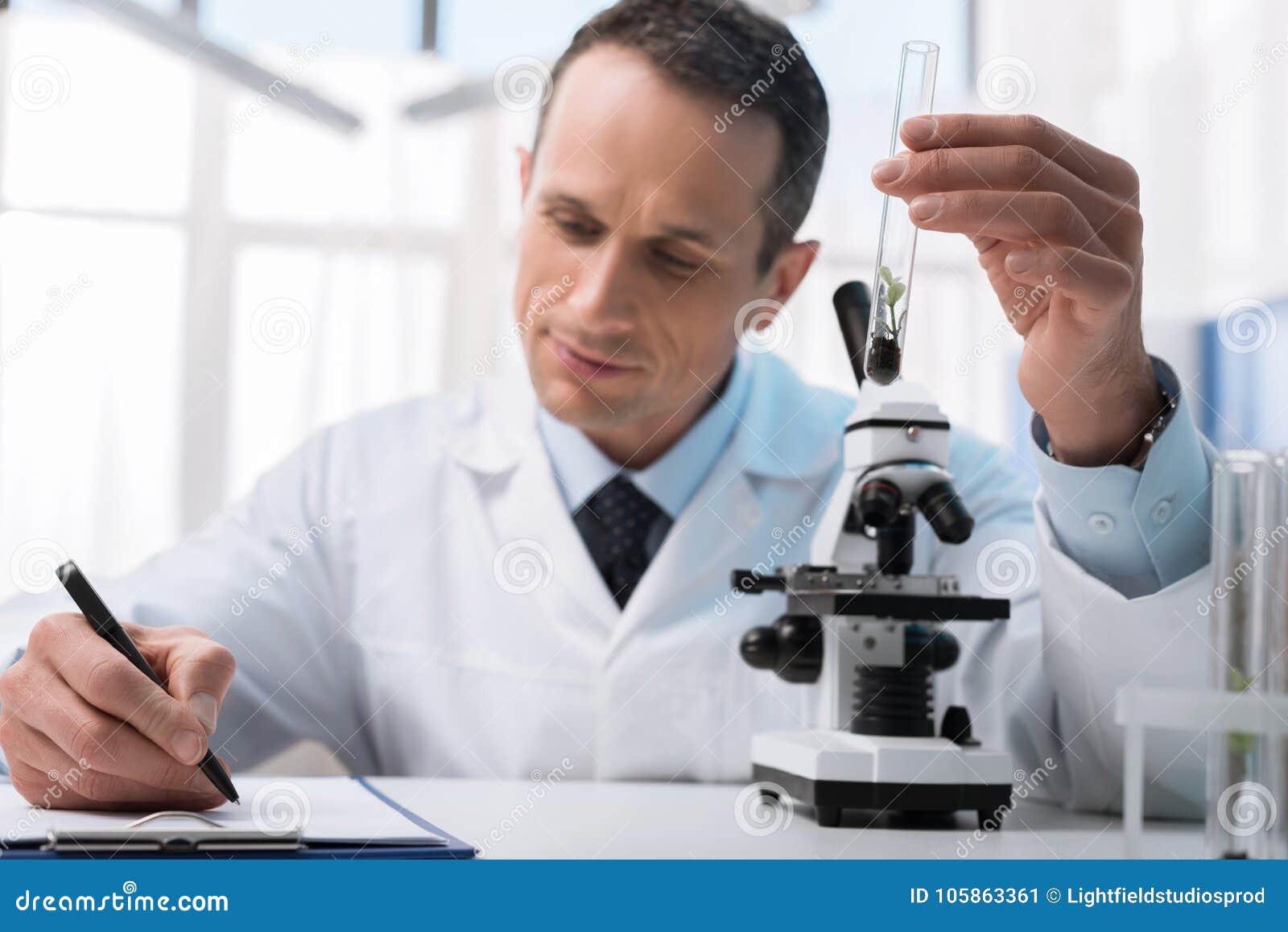 Lab Technician Taking Notes Stock Image - Image of scientist ...