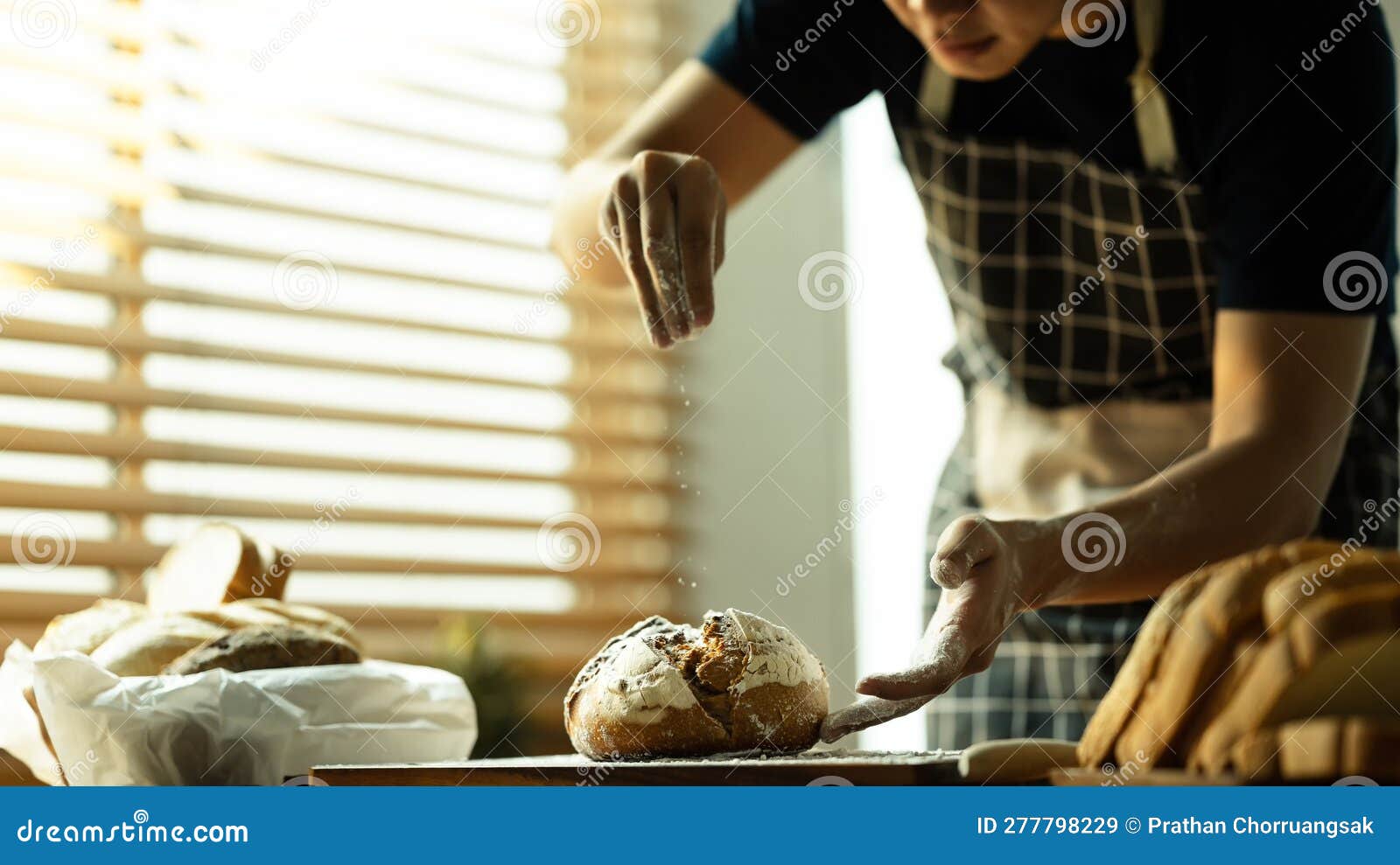 Concentrated Male Baker Sprinkling Flour on Dough, Prepares Bread in ...