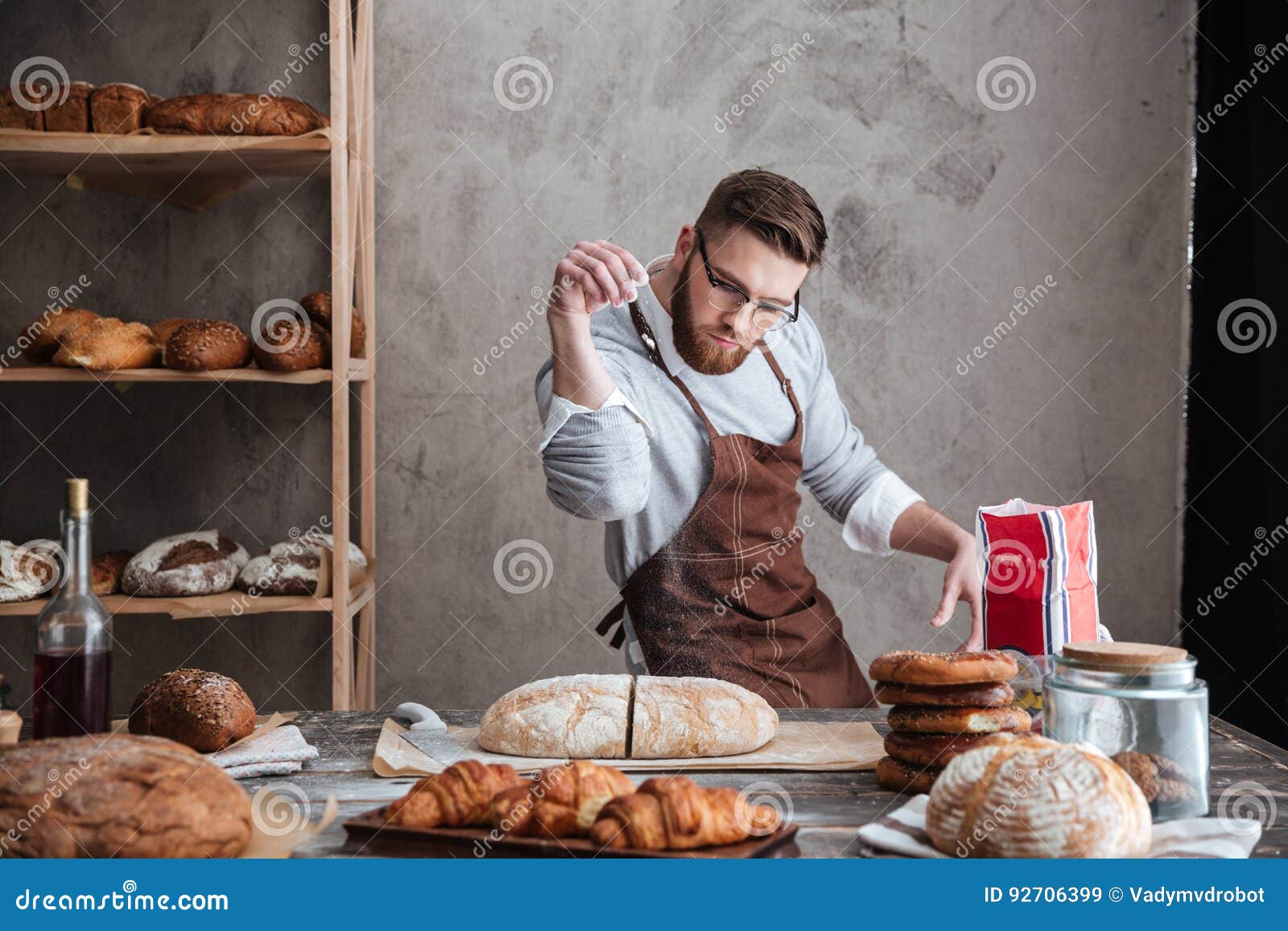 Concentrated Man Baker Standing at Bakery Near Bread Stock Image ...