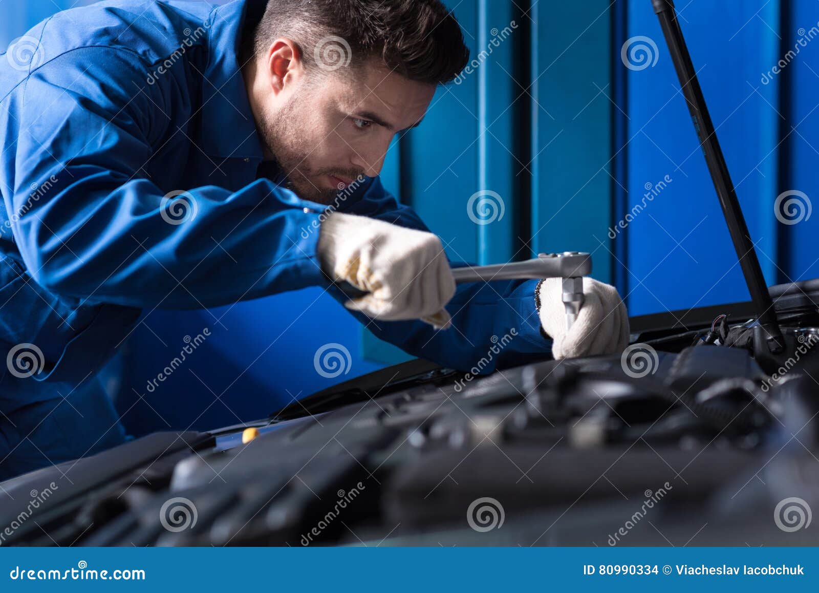 Concentrated Mechanic Repairing Car Engine Stock Photo - Image of ...