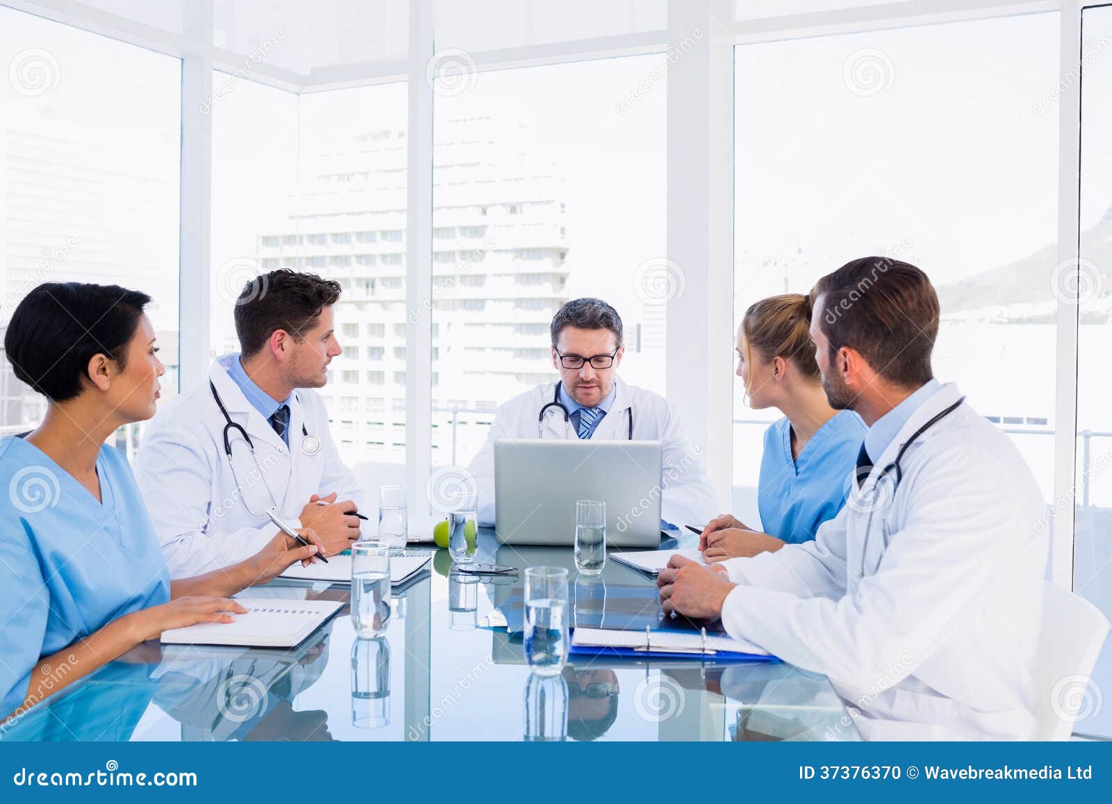 Concentrated Medical Team Around Desk Stock Photo - Image of view ...