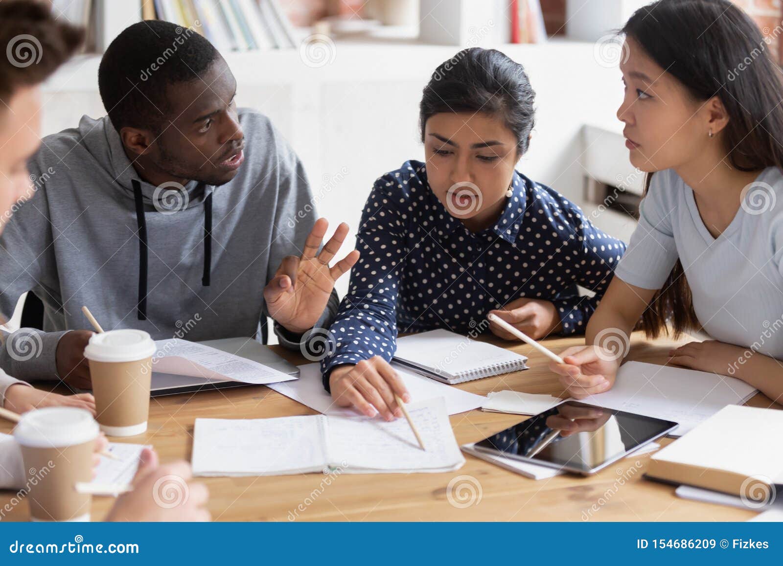 Focused Diverse Students Discuss Ideas Studying in Class Together Stock ...