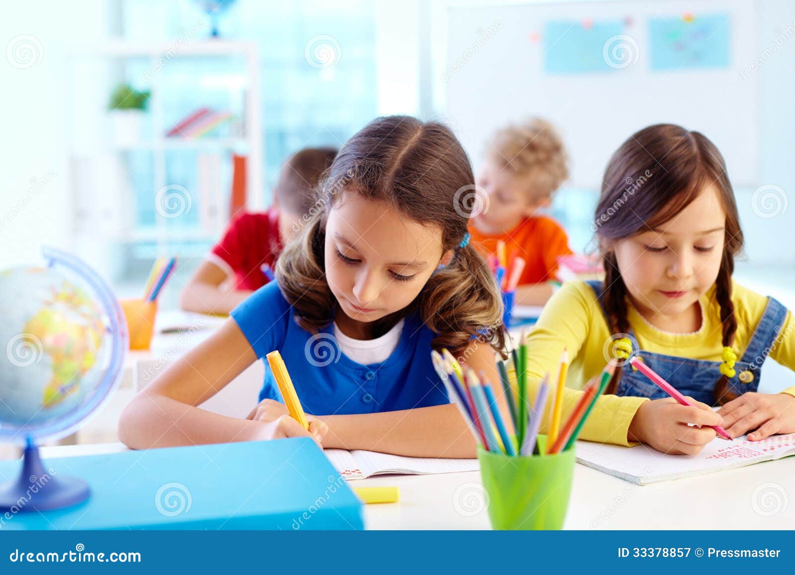 Concentrated pupils stock image. Image of copybooks, busy - 33378857