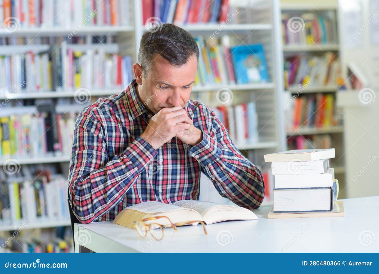 Concentrated Reader in Library Stock Photo - Image of series, reading ...