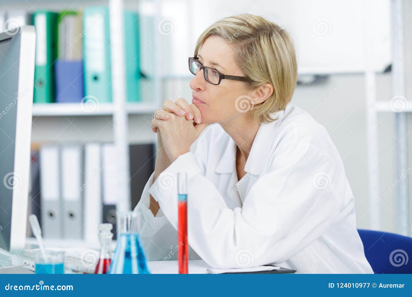 Concentrated Scientist Doing Scientific Experiment in Laboratory Stock ...