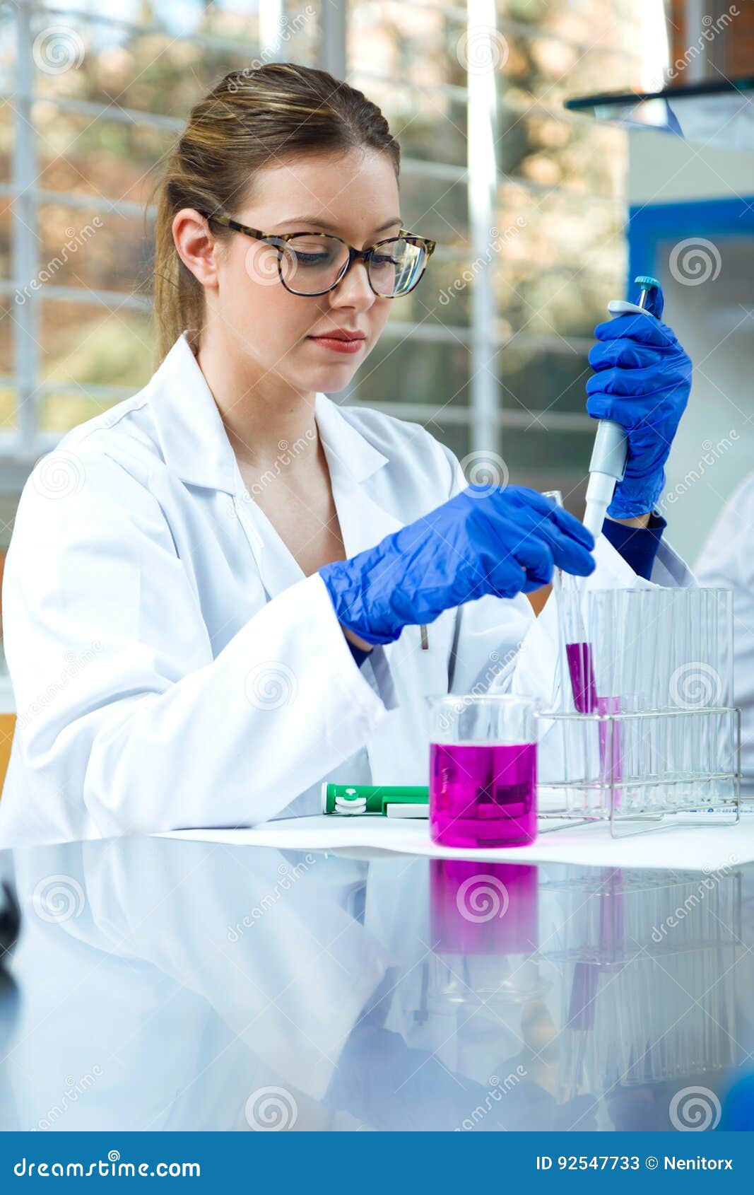 Concentrated Scientist Making Experiment in Laboratory. Stock Image ...