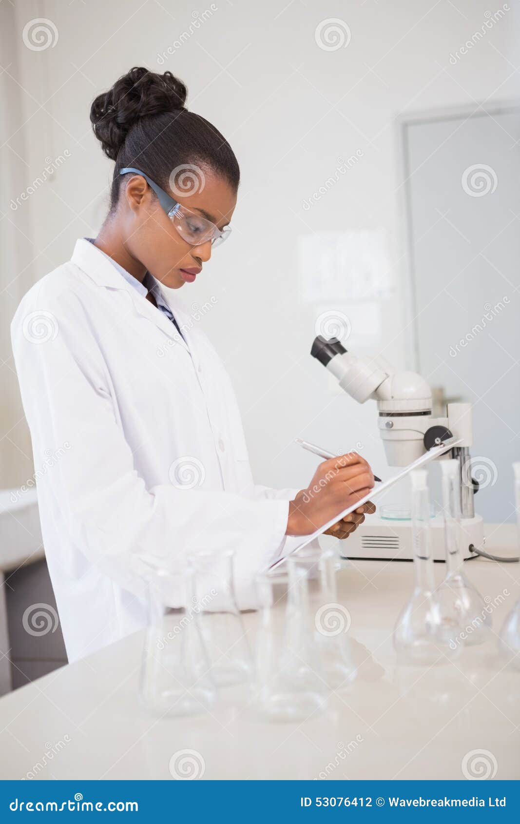 Concentrated Scientist Taking Notes Stock Photo - Image of ...