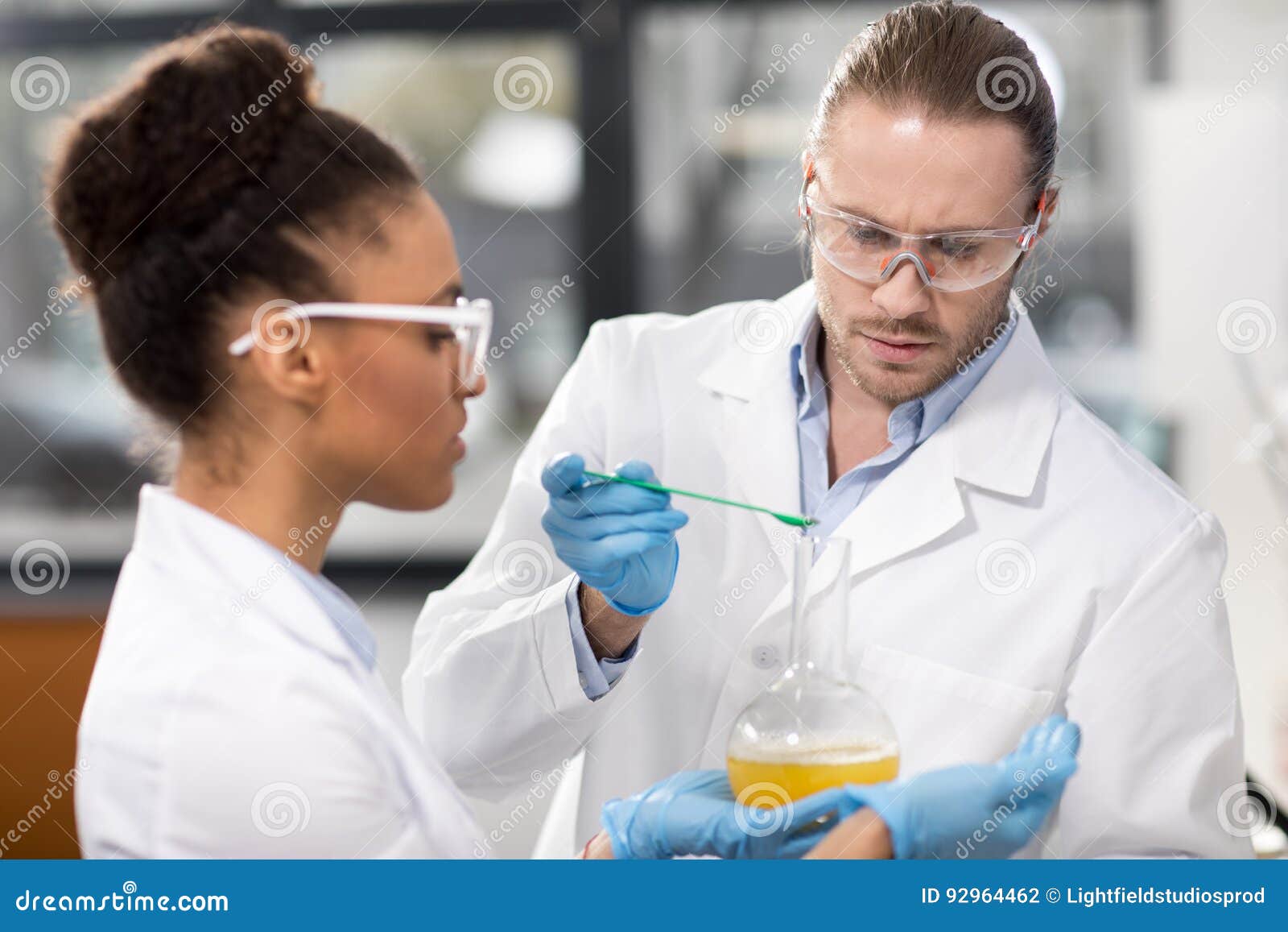 Concentrated Scientists Making Experiment in Laboratory Stock Photo ...