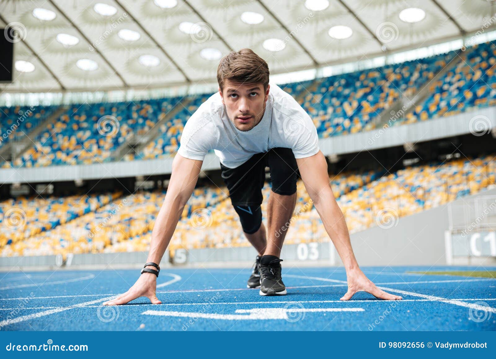 Concentrated Sprinter Getting Ready To Start a Race Stock Photo - Image ...