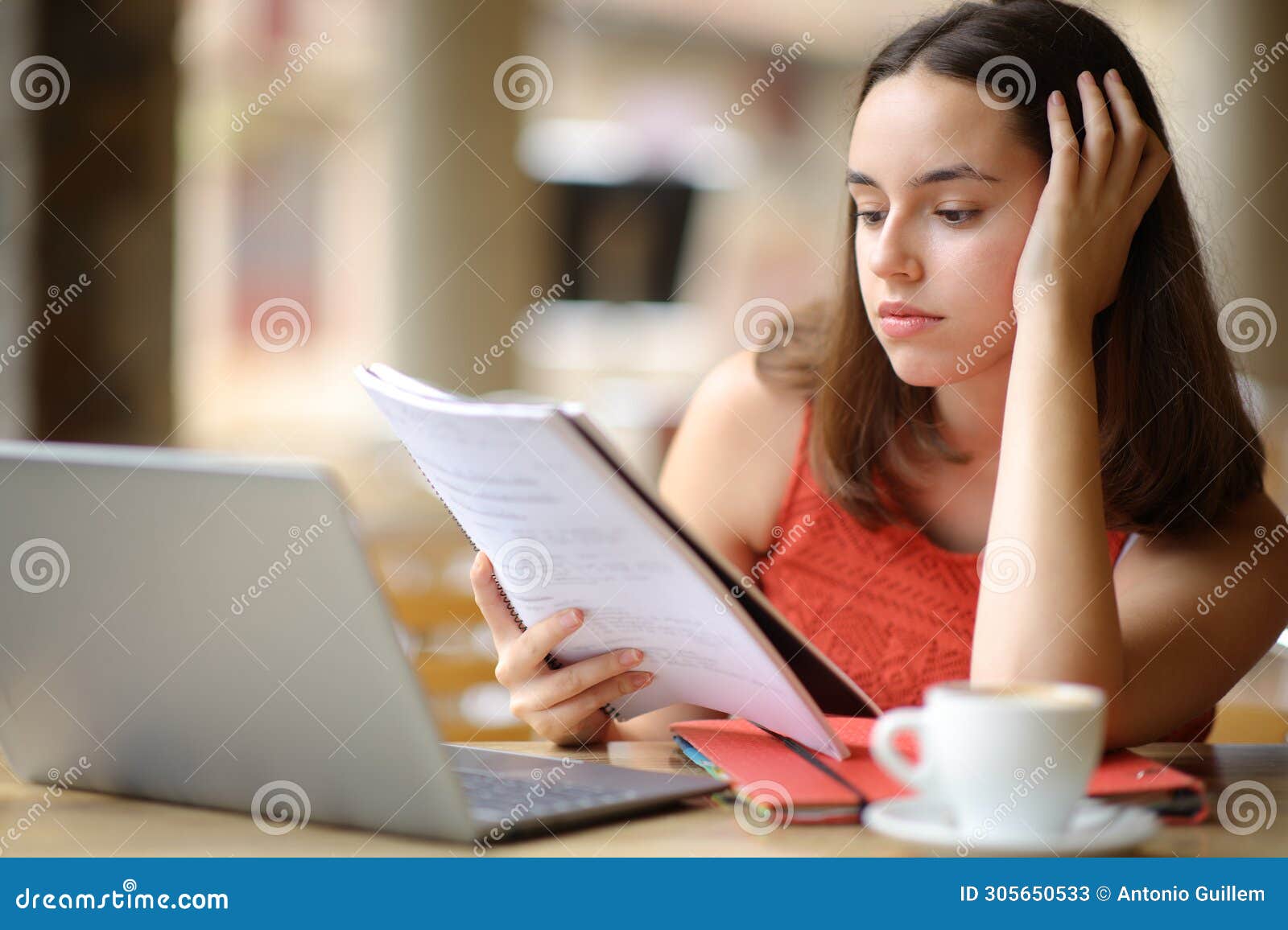 Concentrated Student Memorizing Notes in a Bar Stock Image - Image of ...