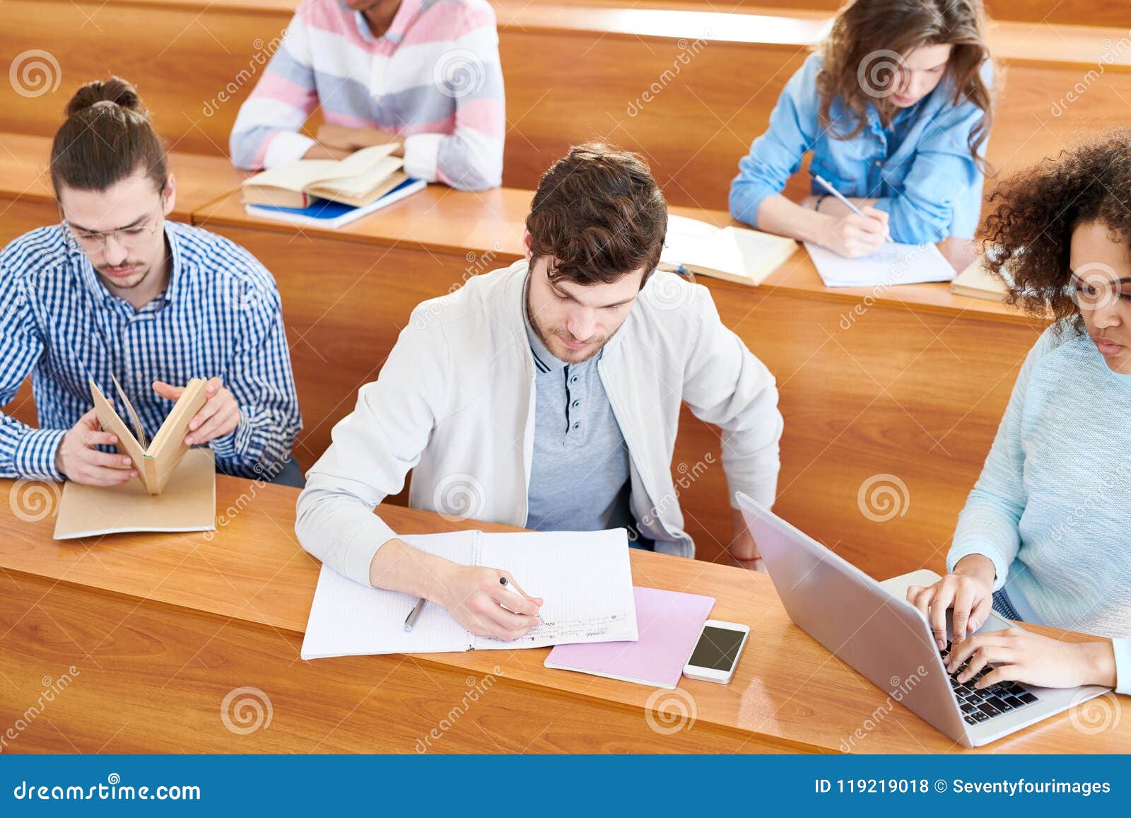Concentrated Students Doing Task at Class Stock Photo - Image of ...