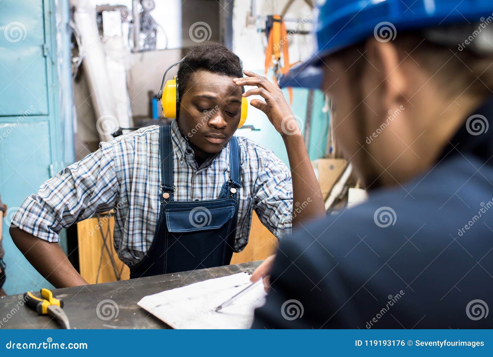 Concentrated Manual Worker Listening To Plan of Boss Stock Photo ... Concentrated Manual Worker Listening To Plan of Boss Stock Photo ...