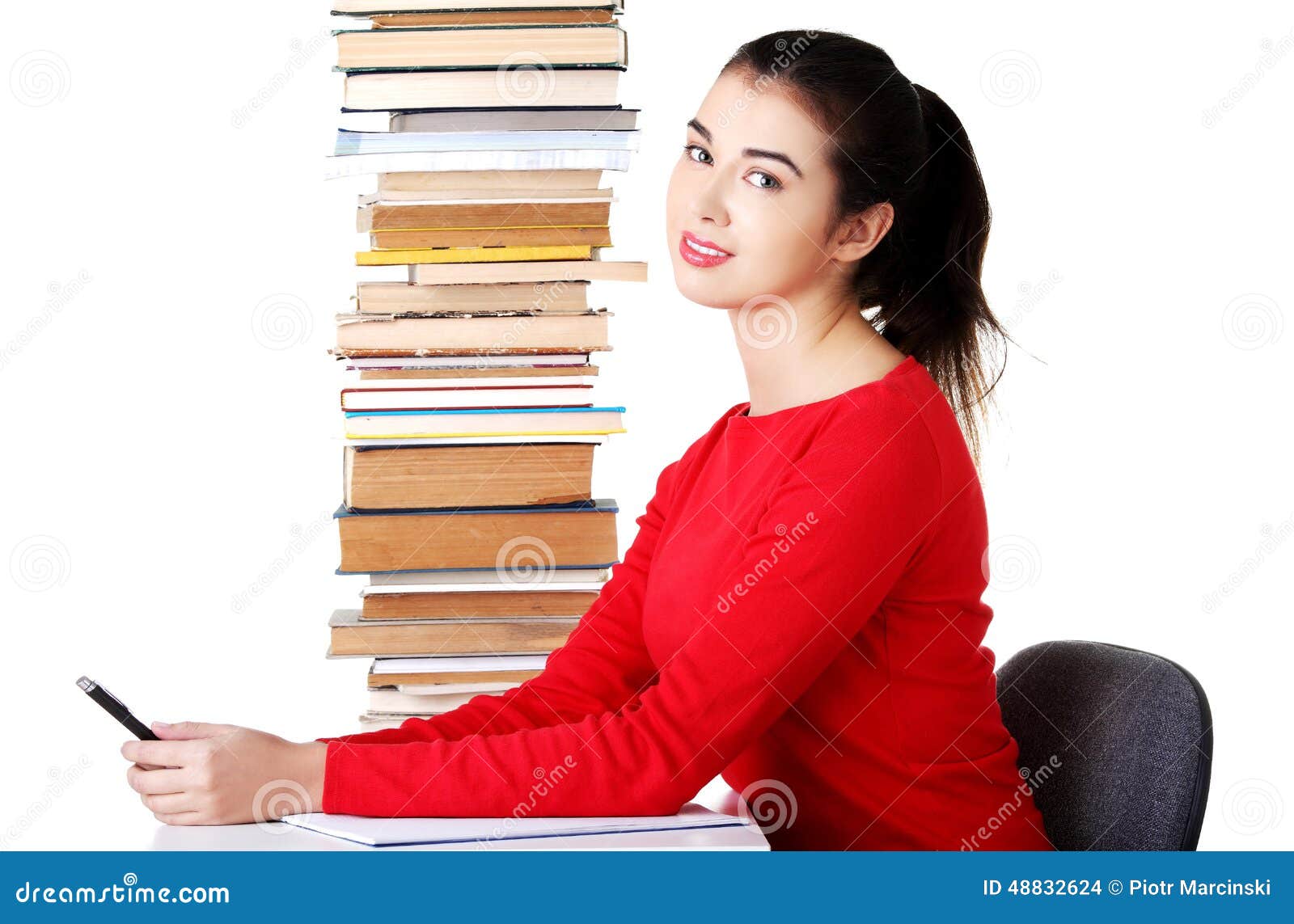 Concentrated Woman Sitting with Stack of Books Stock Photo - Image of ...