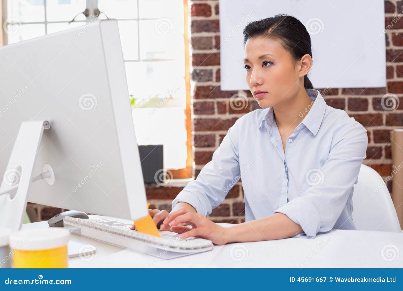 Concentrated Woman Using Computer at Desk Stock Image - Image of ...
