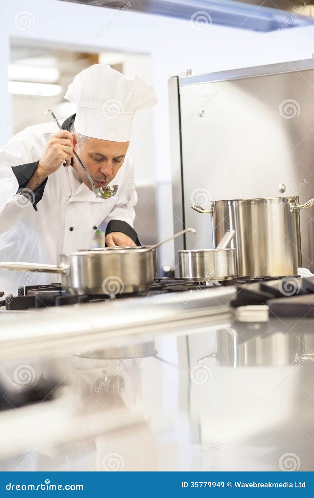 Concentrating Head Chef Tasting Food from Ladle Stock Image - Image of ...