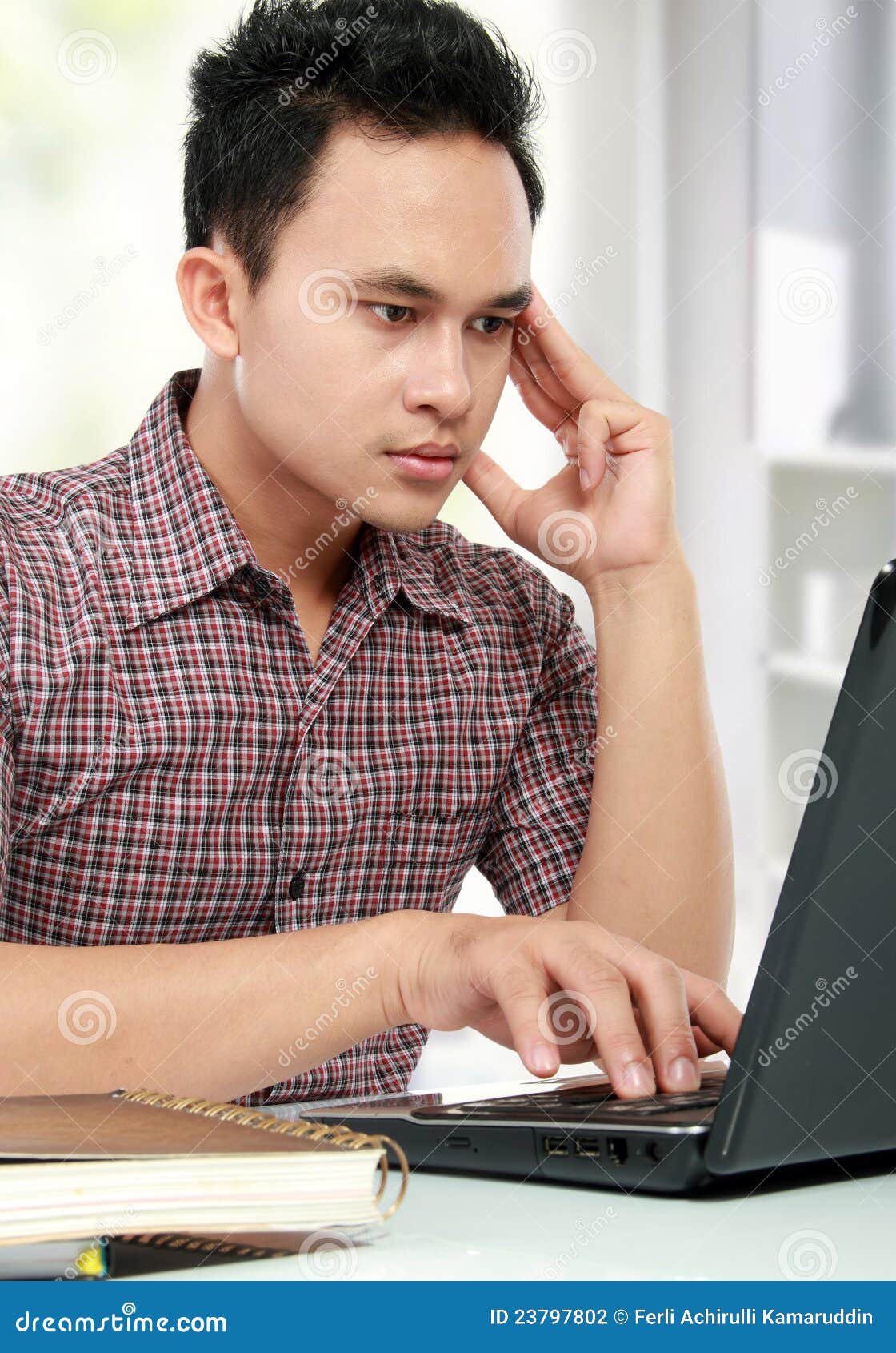 Concentrating Man Working with Laptop at His Desk Stock Photo - Image ...