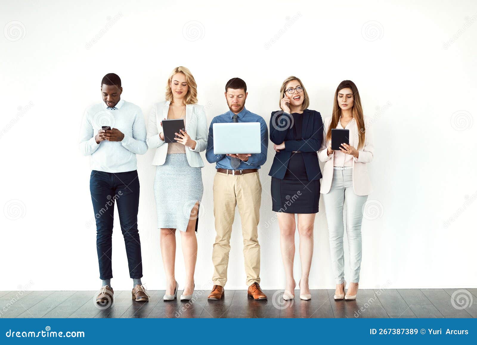 Concentrating is Part of What they Do. a Group of Work Colleagues ...