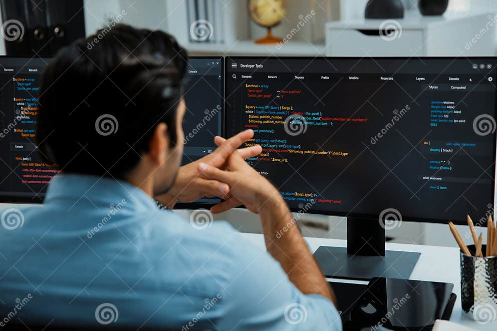 Concentrating In Smart It Developer Working Coding On Two Pc Screen Surmise Stock Image