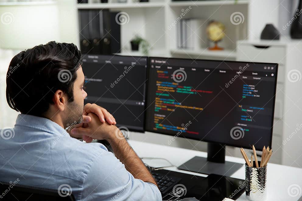 Concentrating in Smart it Developer Working Coding on Two Pc Screen. Surmise. Stock Image ...