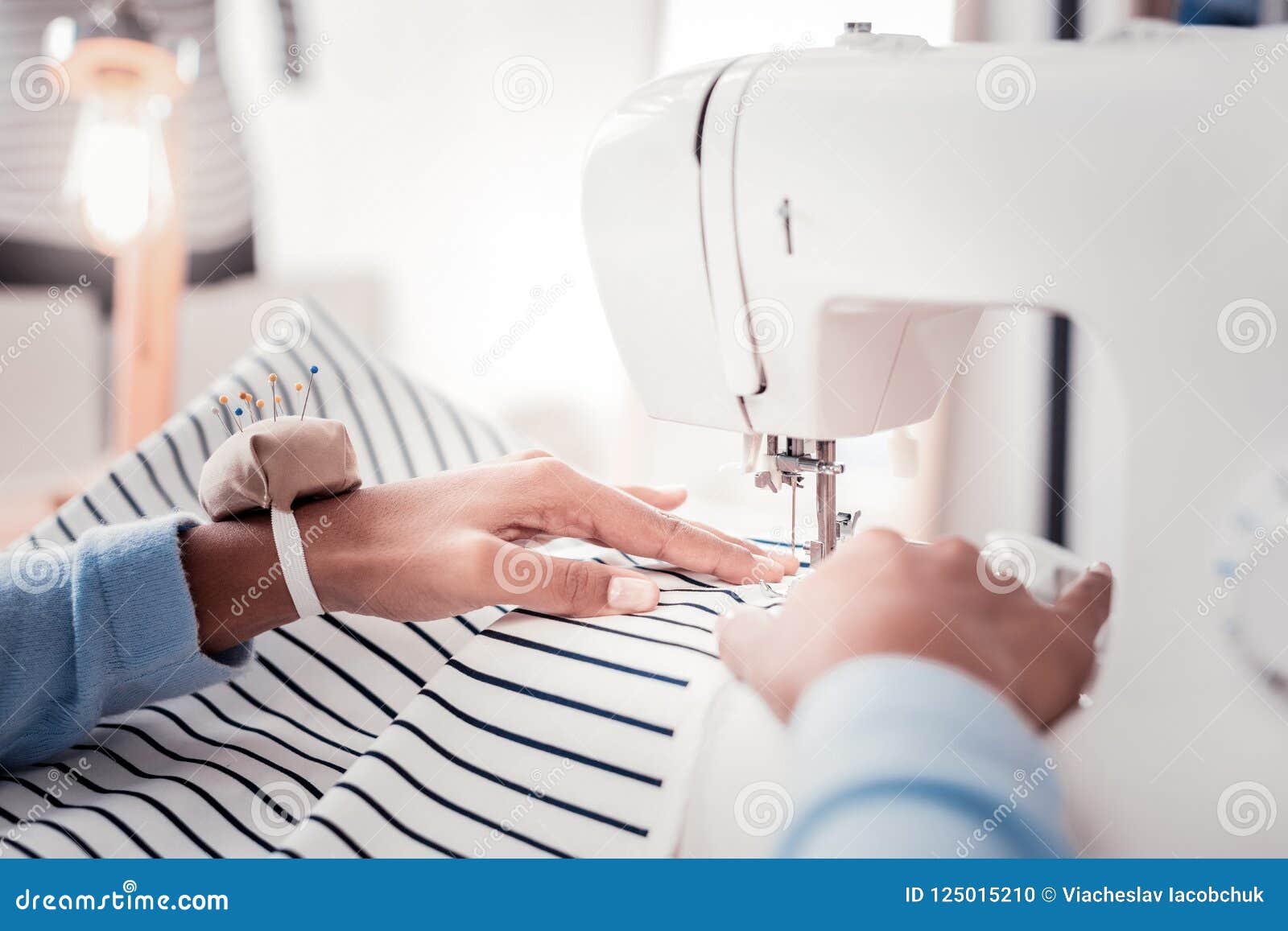 Close Up of Sewing Process in Well Equipped Showroom Stock Photo ...