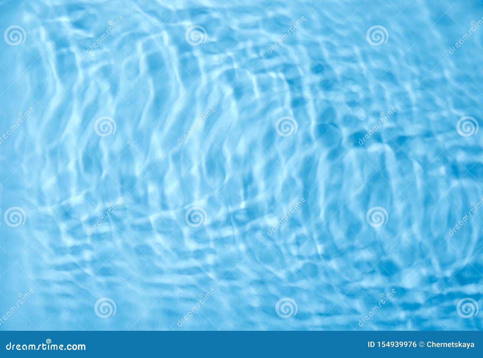Concentric Waves on Blue Water Surface after Falling Drops Stock Photo ...