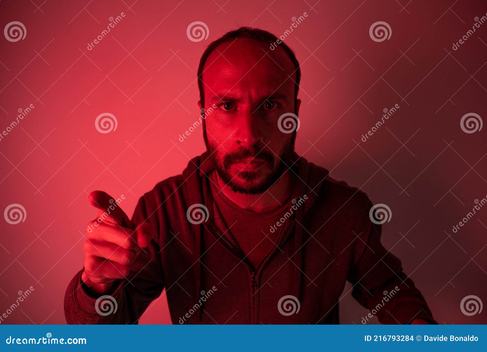 Concept Af Angry and Abusive Man with Red Light. Studio Portrait of ...