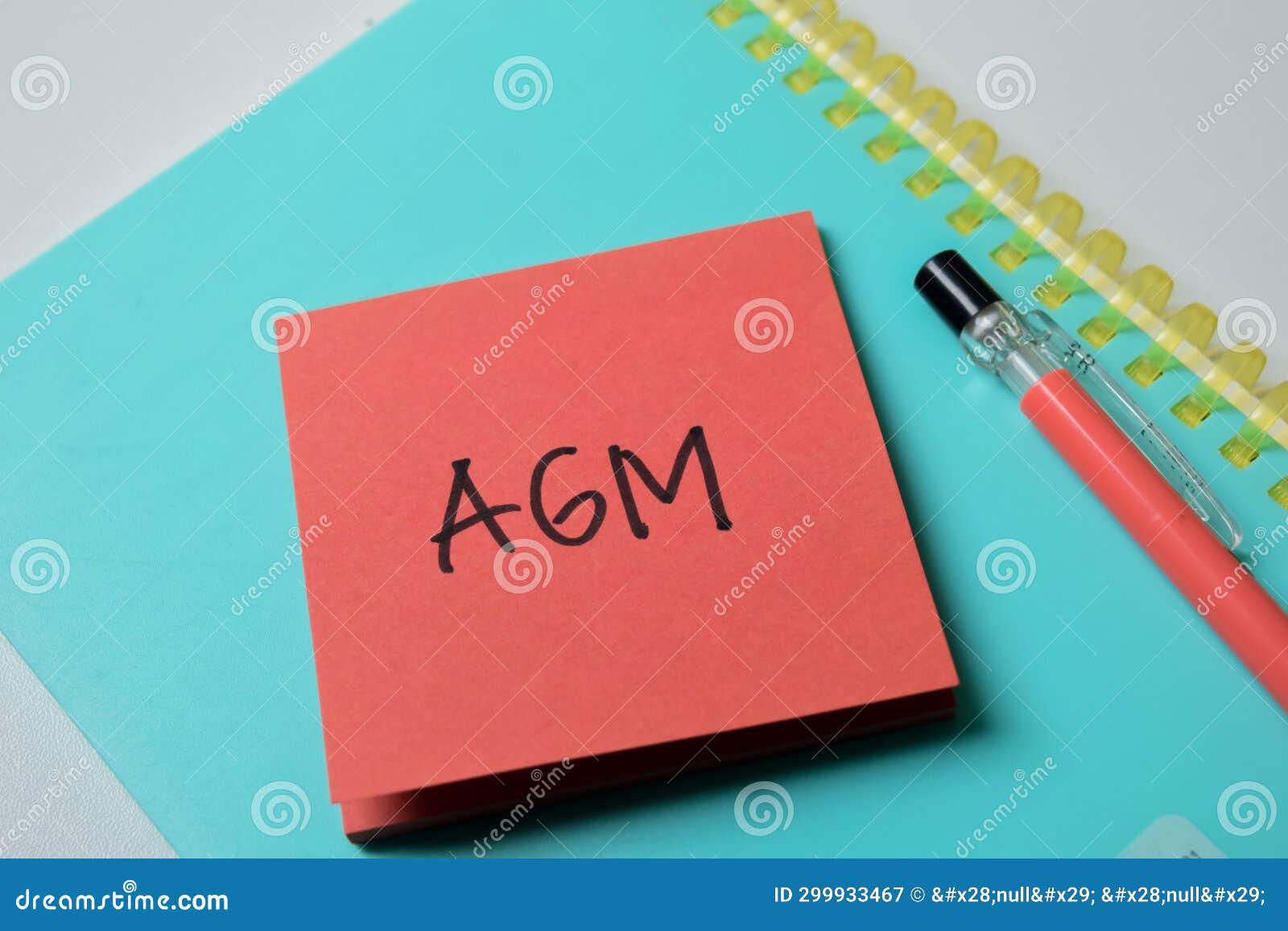 Concept of AGM Write on Sticky Notes Isolated on White Background Stock ...