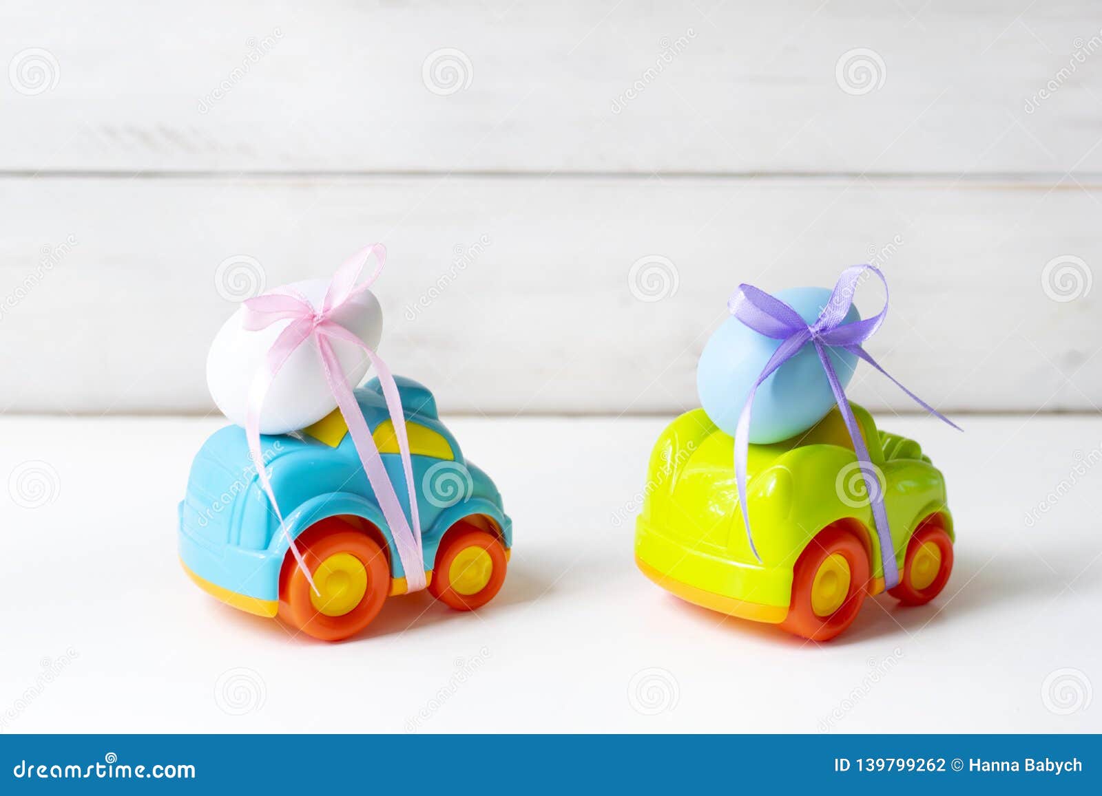 Two Easter Cars with an Egg and a Car with the Inscription Stock Photo ...