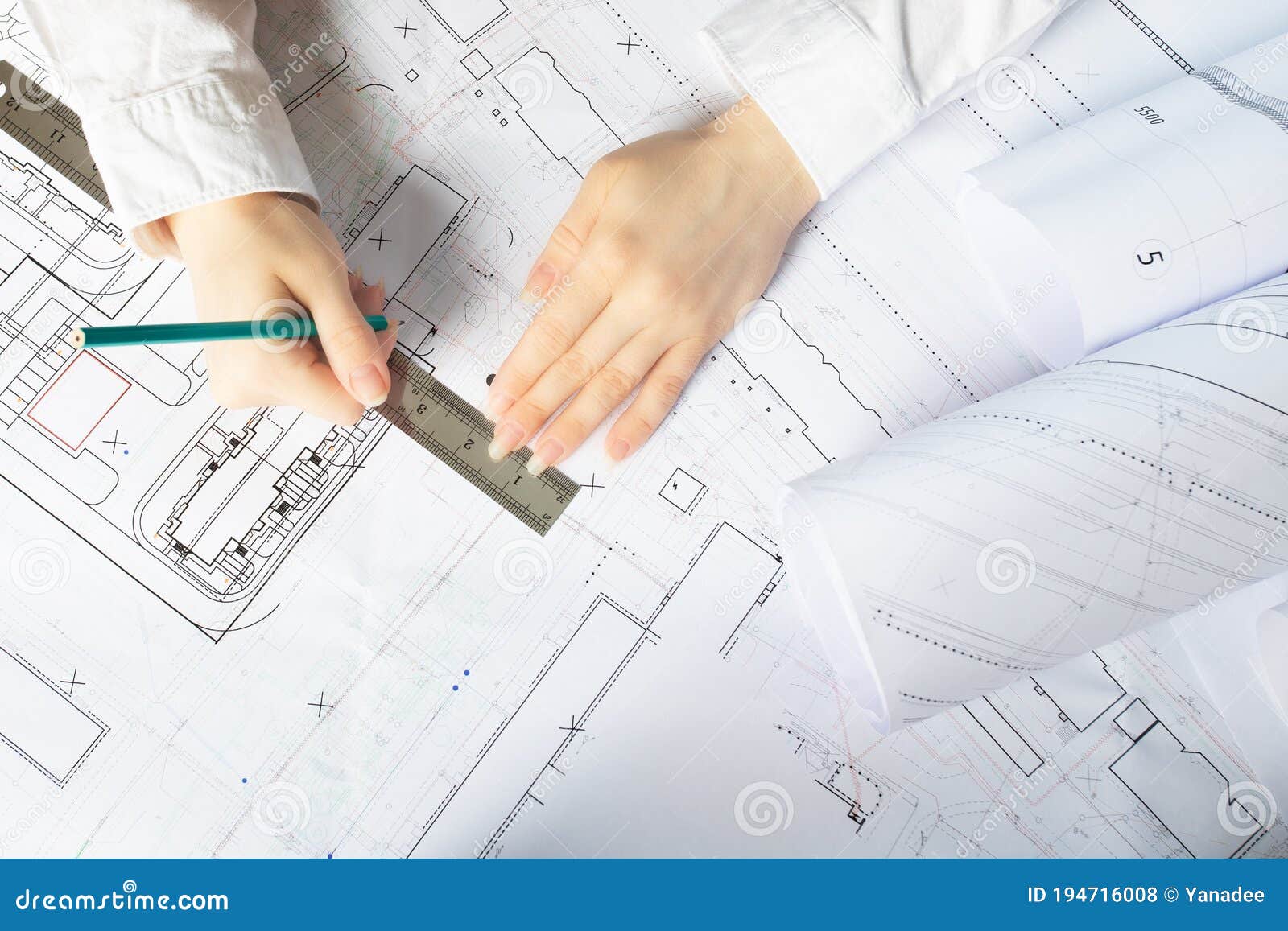 The Concept Of Architecture. The Designer Architect Holds A Pencil And ...