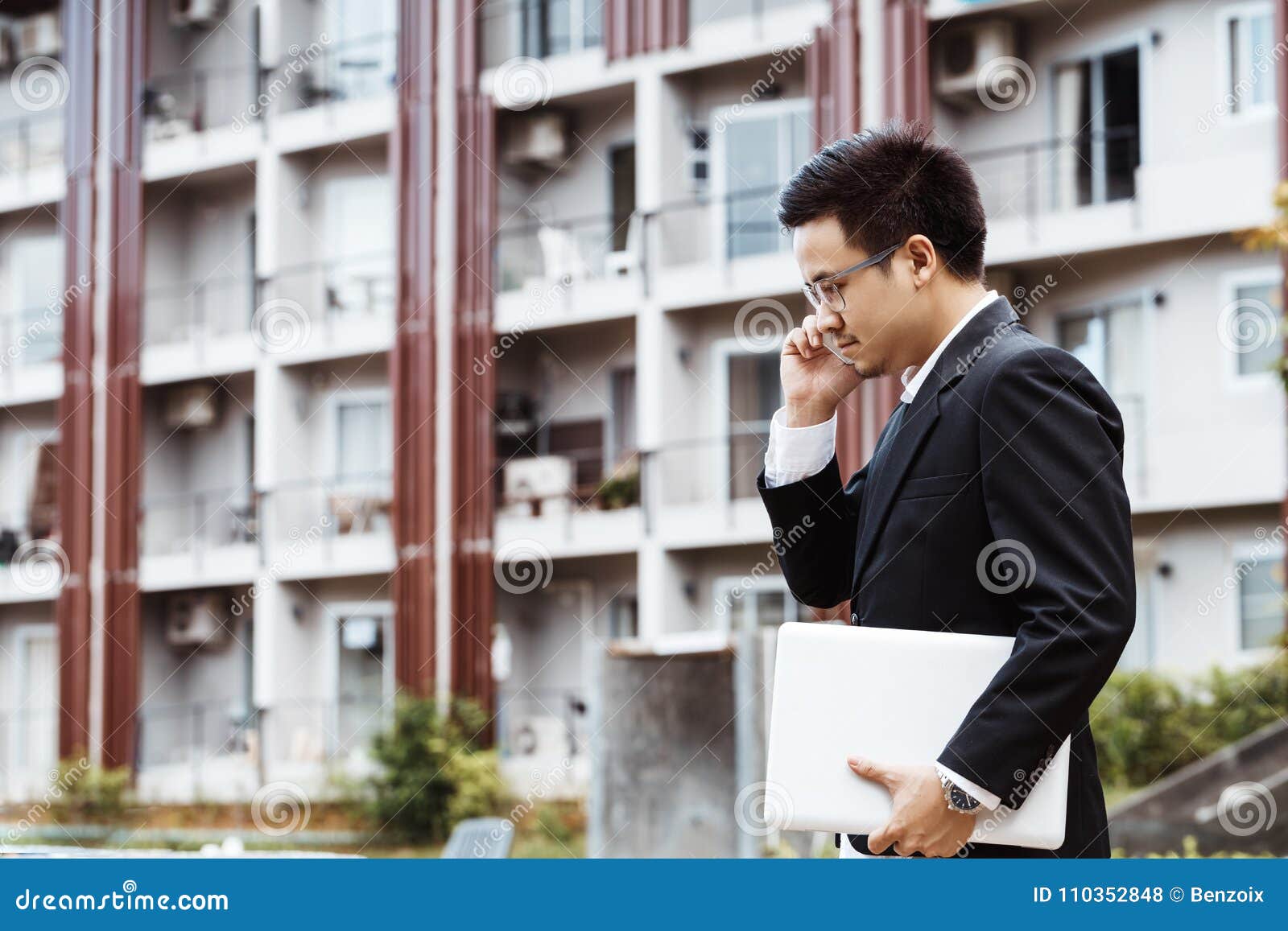 Concept Business - Handsome Asian Business Man Working on Property ... Concept Business - Handsome Asian Business Man Working on Property ...