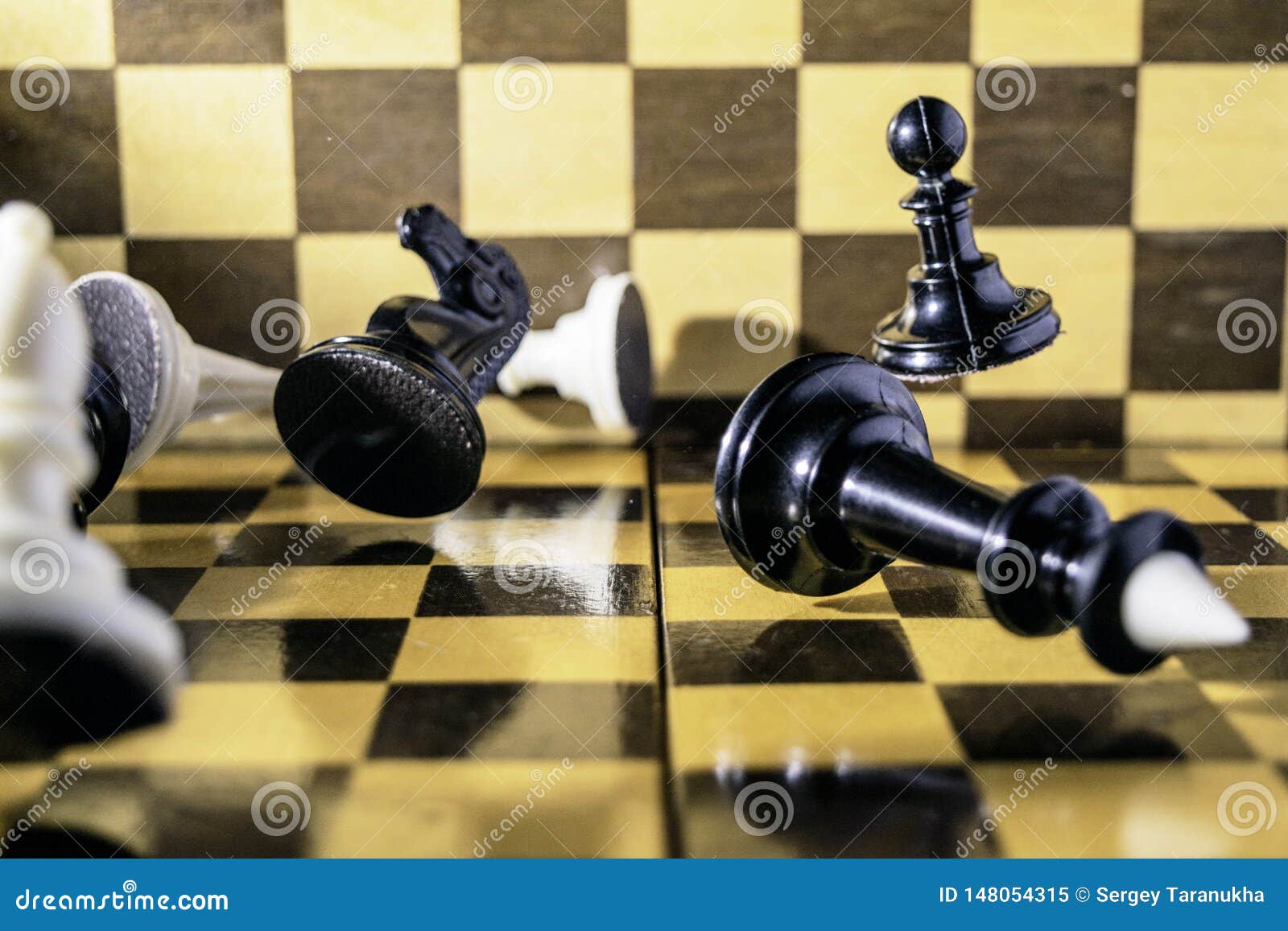 Concept, Chess Pieces Falling on a Chessboard Stock Image - Image of ...