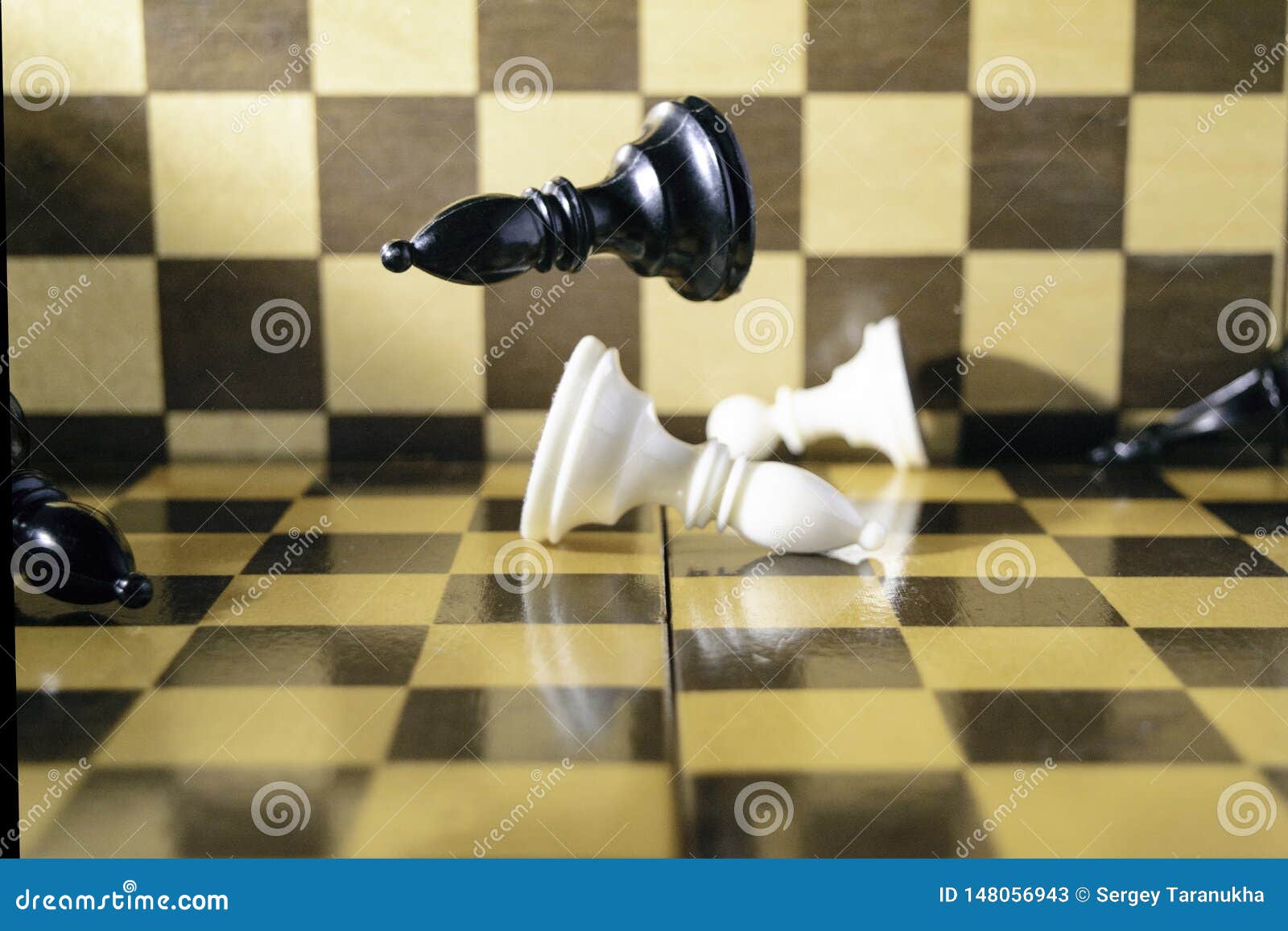 Concept, Chess Pieces Falling on a Chessboard Stock Image - Image of ...