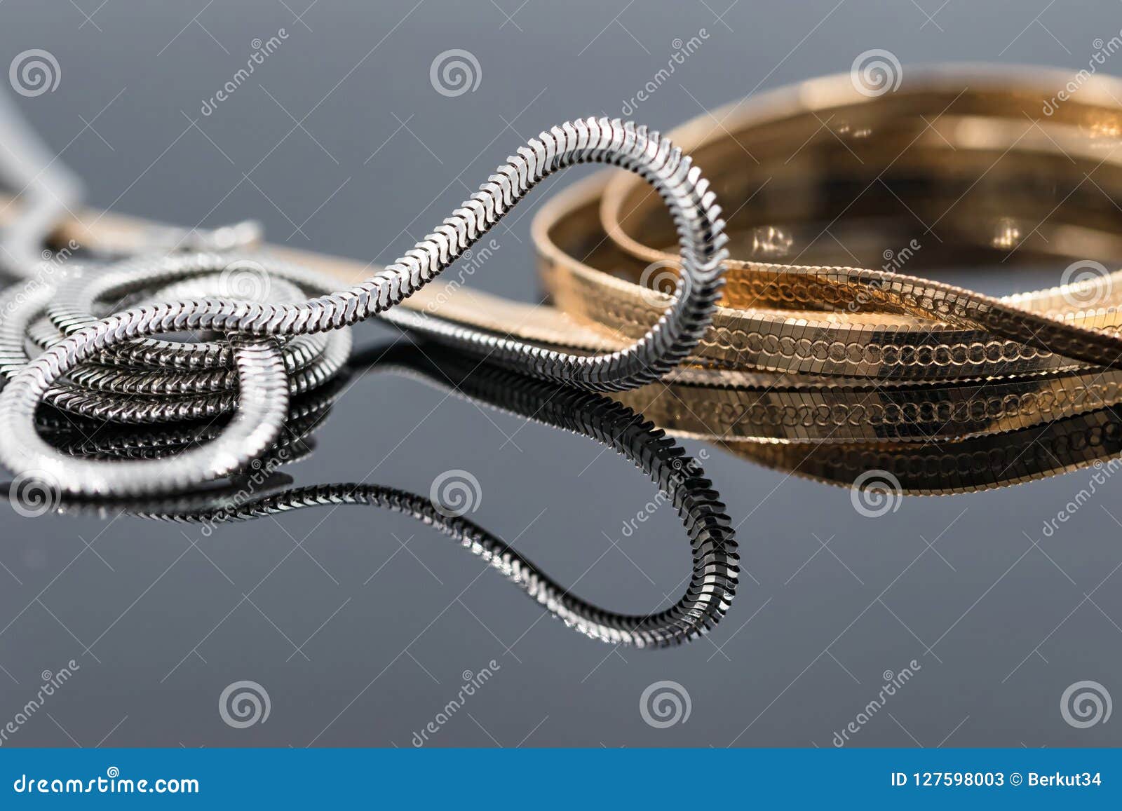 Concept: Choice between Silver and Gold Chain Stock Image - Image of ...