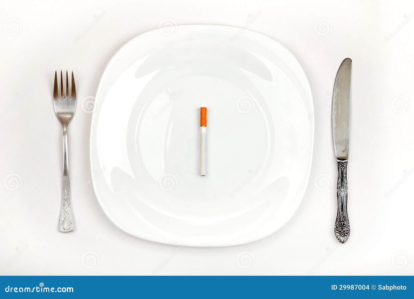 Cigarette on Dinner Plate stock photo. Image of food - 29987004