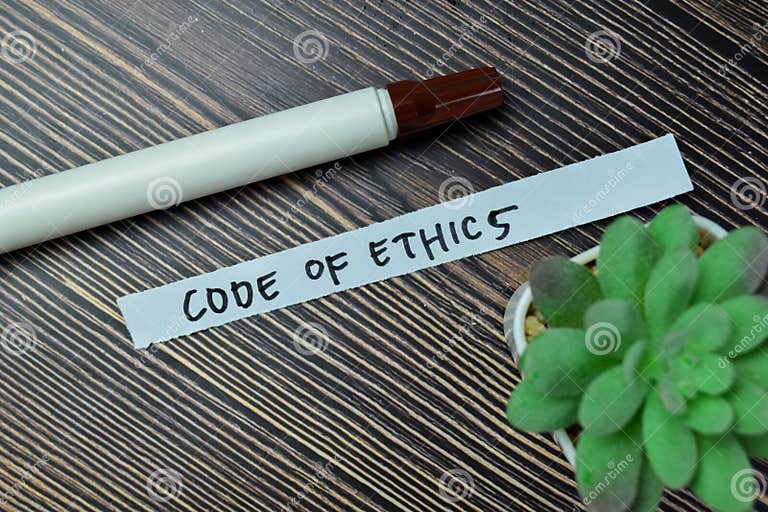 Concept of Code of Ethics Write on Sticky Notes Isolated on Wooden ...