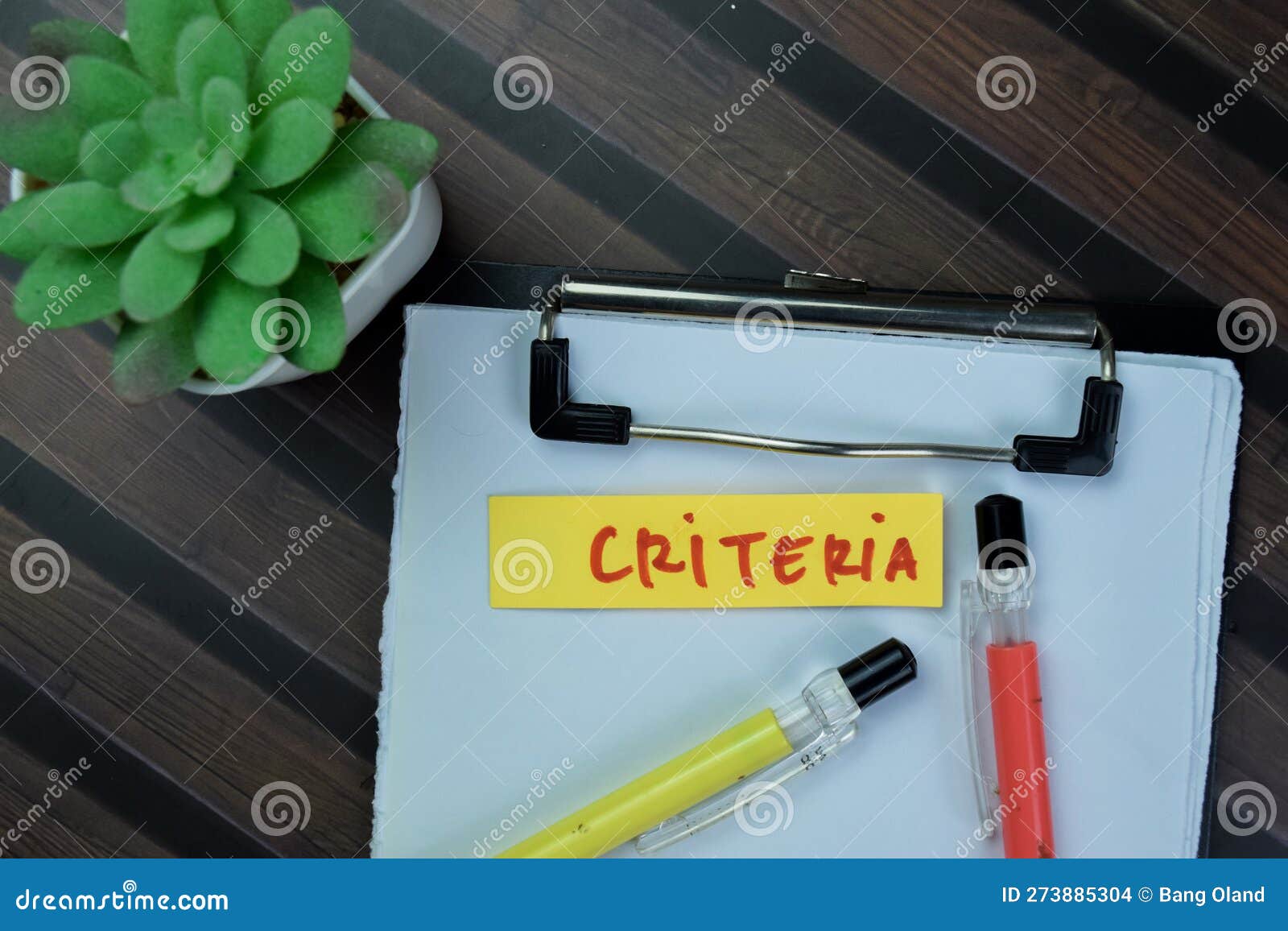 Concept of Criteria Write on Sticky Notes Isolated on Wooden Table ...