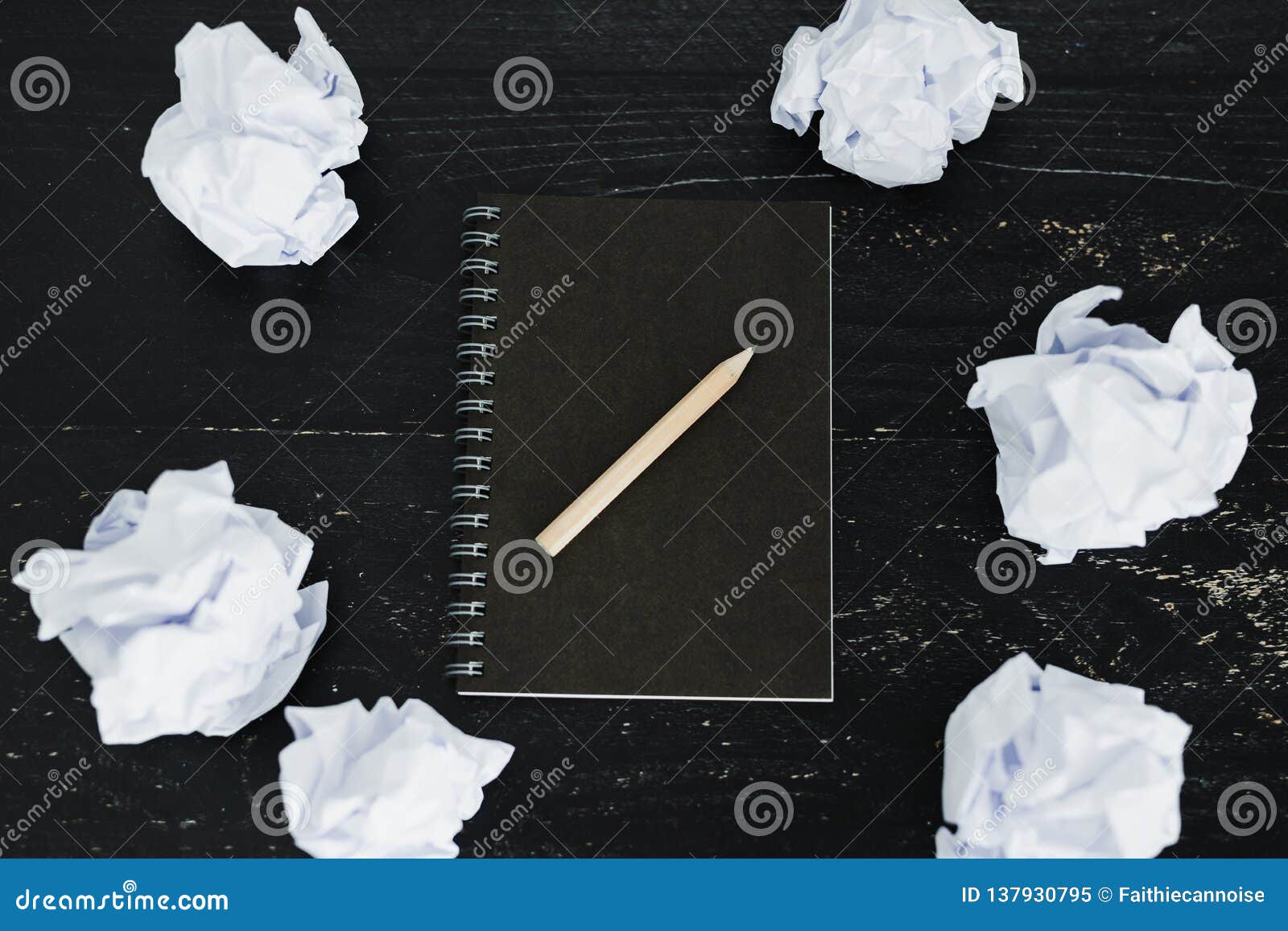 Set of Scrunched Paper Balls and Empty Notepad on Dark Moody Background ...