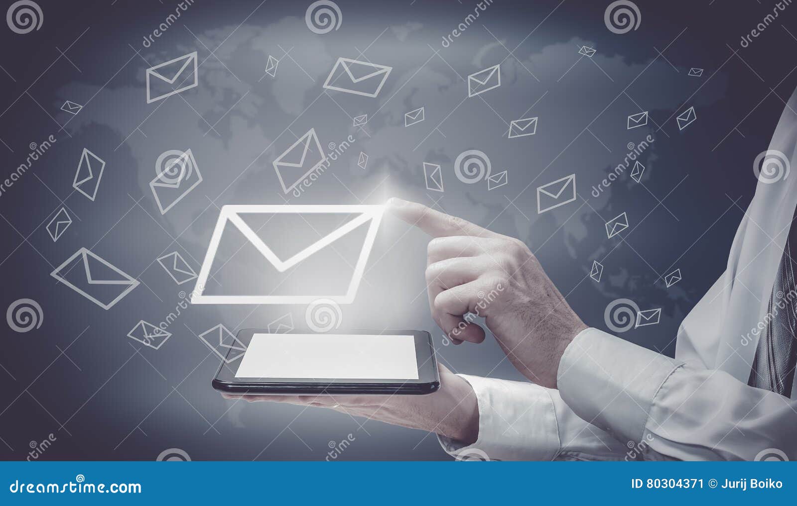 The Concept of Email Marketing. Businessman Makes Sending Emails from ... The Concept of Email Marketing. Businessman Makes Sending Emails from ...