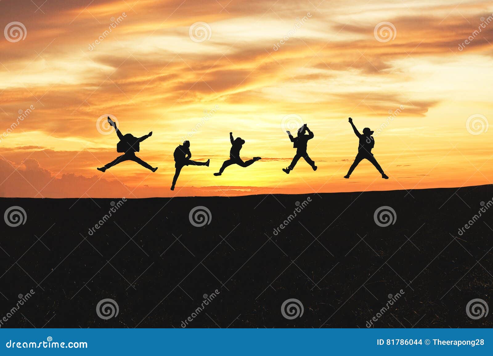 Concept of Emotion. Silhouette of a Happy Group of People Jumping at ...